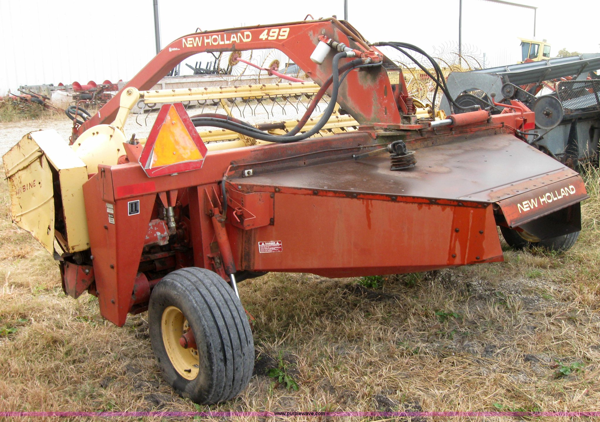 New Holland 499 sickle swather in Wamego, KS | Item 5245 sold | Purple Wave