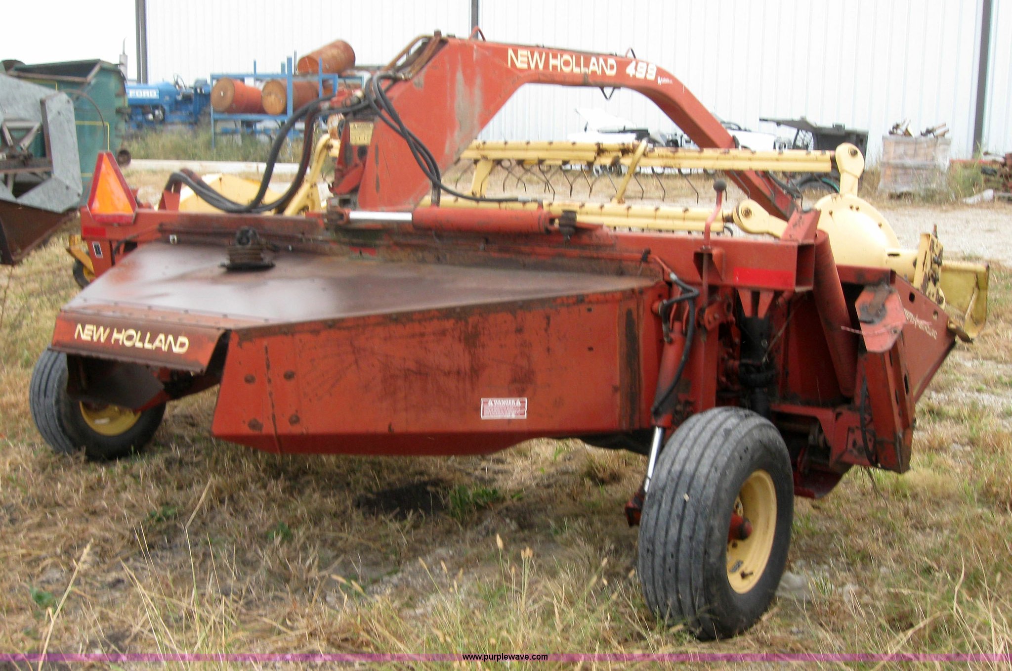 New Holland 499 sickle swather in Wamego, KS | Item 5245 sold | Purple Wave