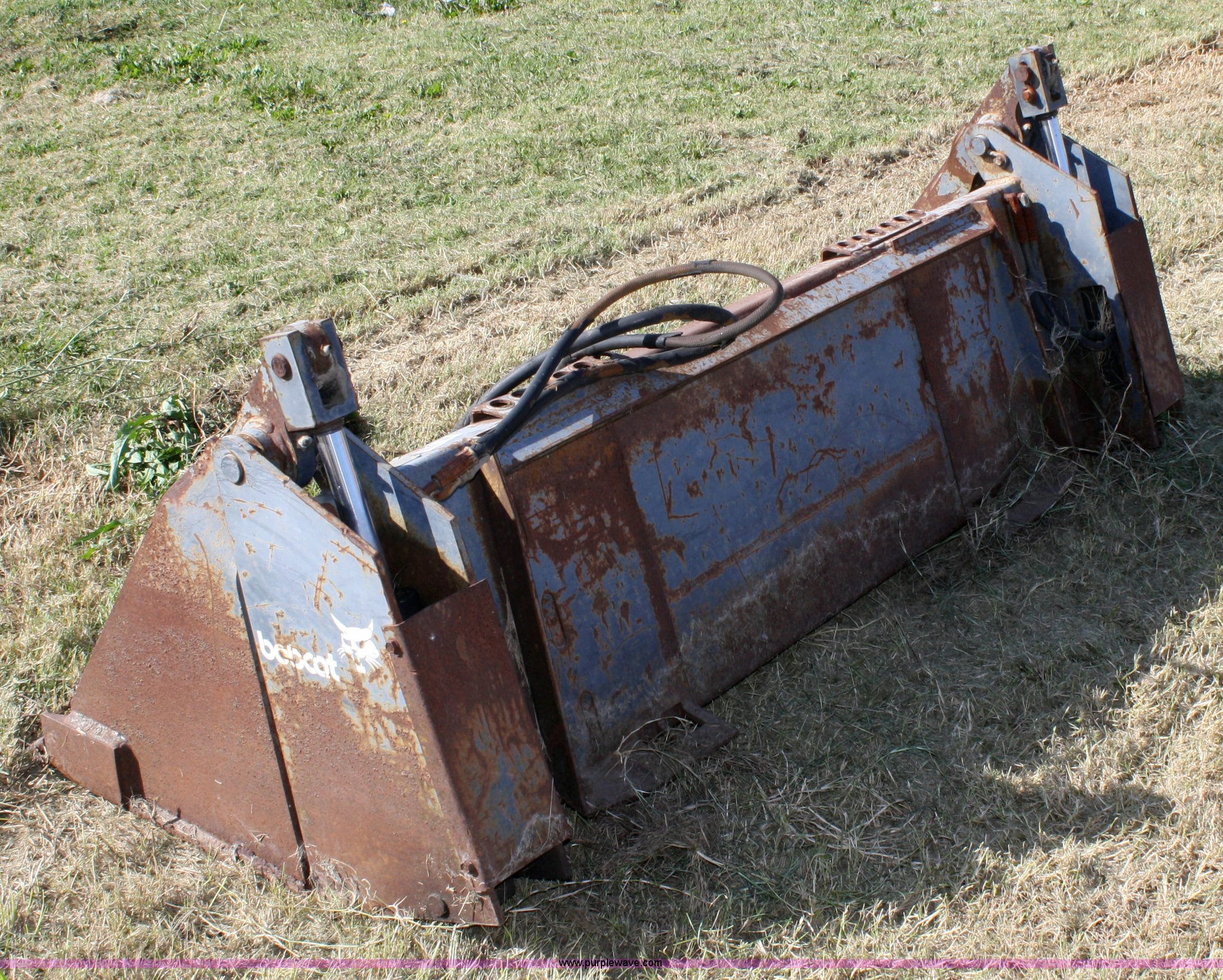 Bobcat skid steer combo bucket in Shawnee, KS | Item 4696 sold | Purple ...