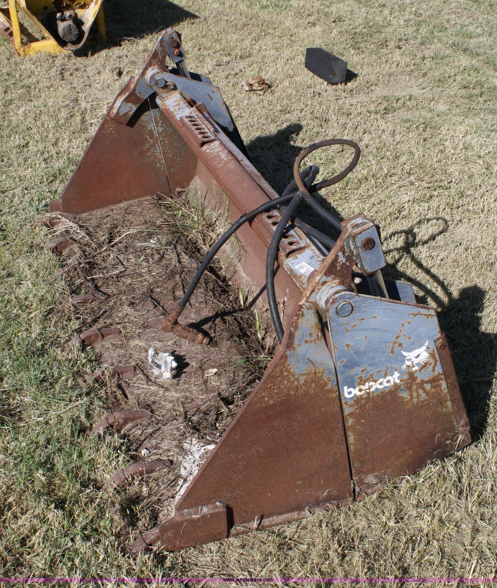 Bobcat skid steer combo bucket in Shawnee, KS | Item 4696 sold | Purple ...