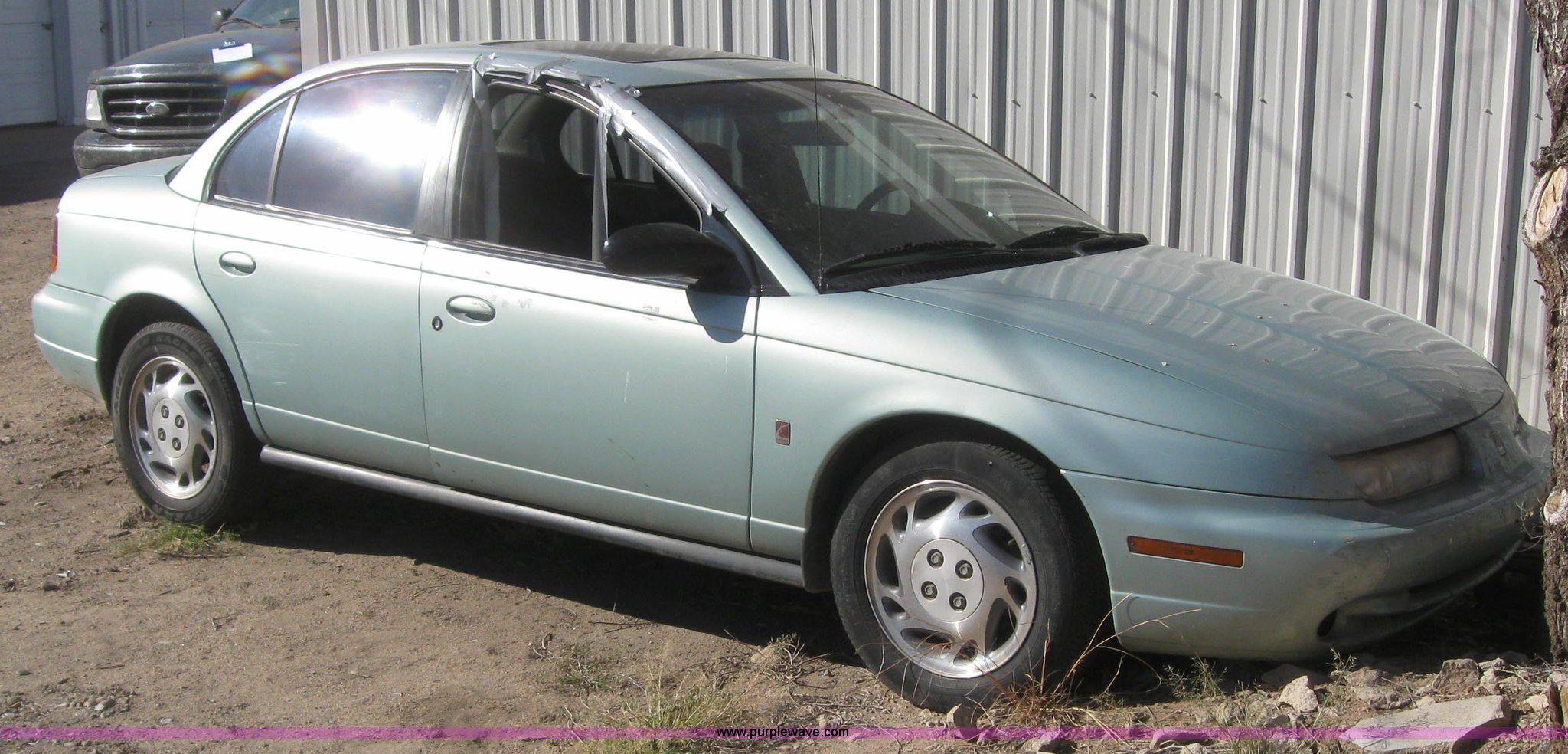 1997 Saturn SL2 in Liberal, KS | Item 3103 sold | Purple Wave