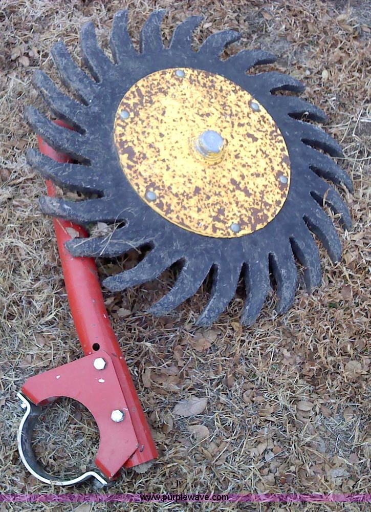 Gathering wheels from New Holland BR780 round baler in Bushton, KS ...