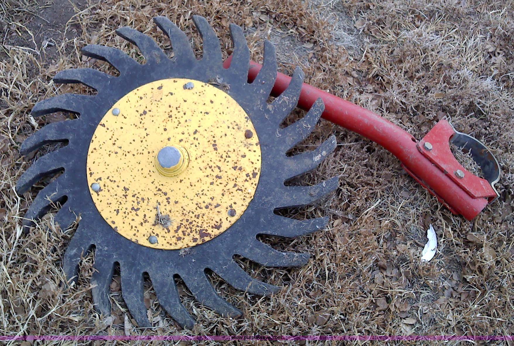 Gathering wheels from New Holland BR780 round baler in Bushton, KS ...