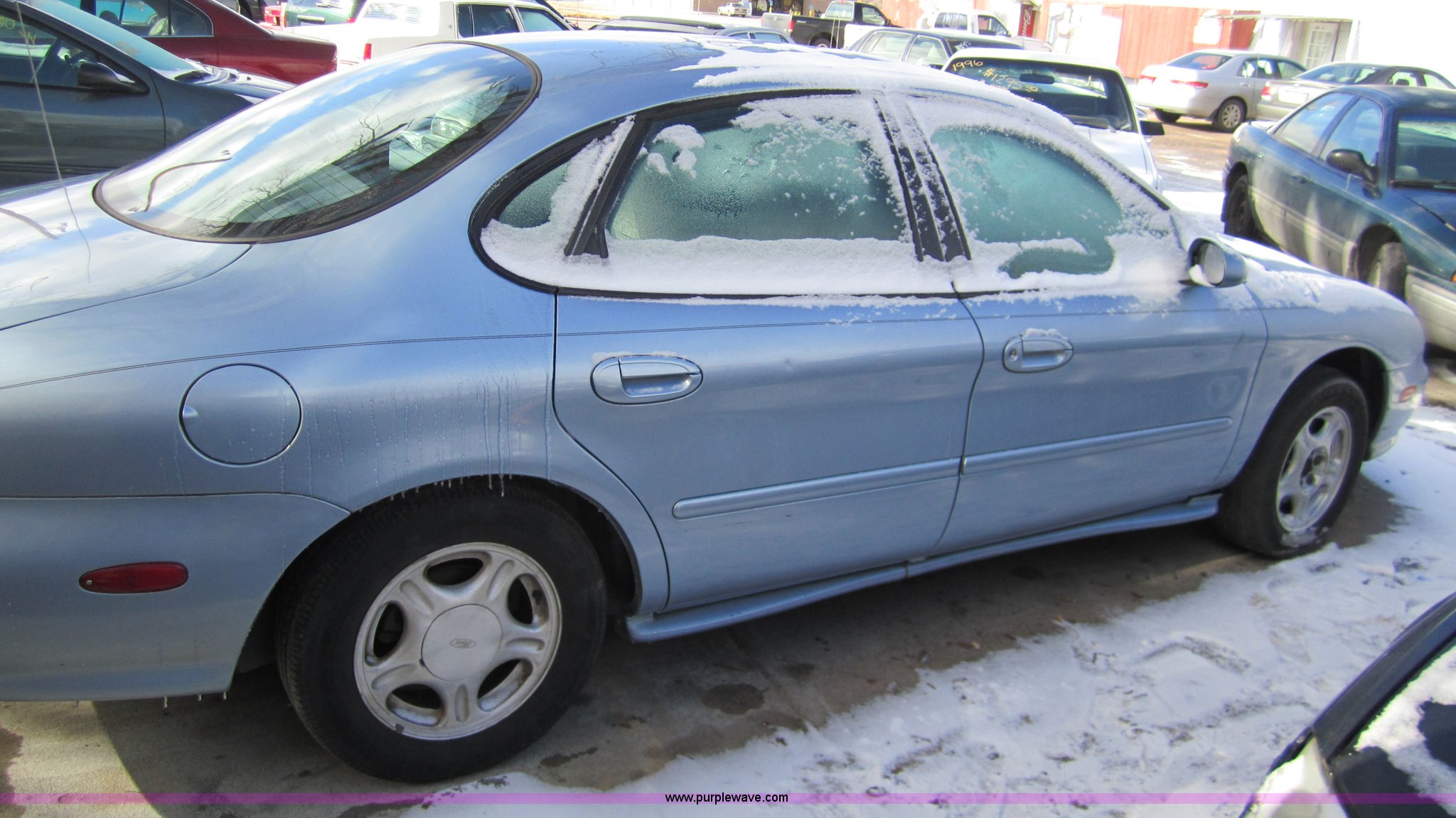 1998 Ford Taurus SE in Dodge City, KS | Item 3309 sold | Purple Wave