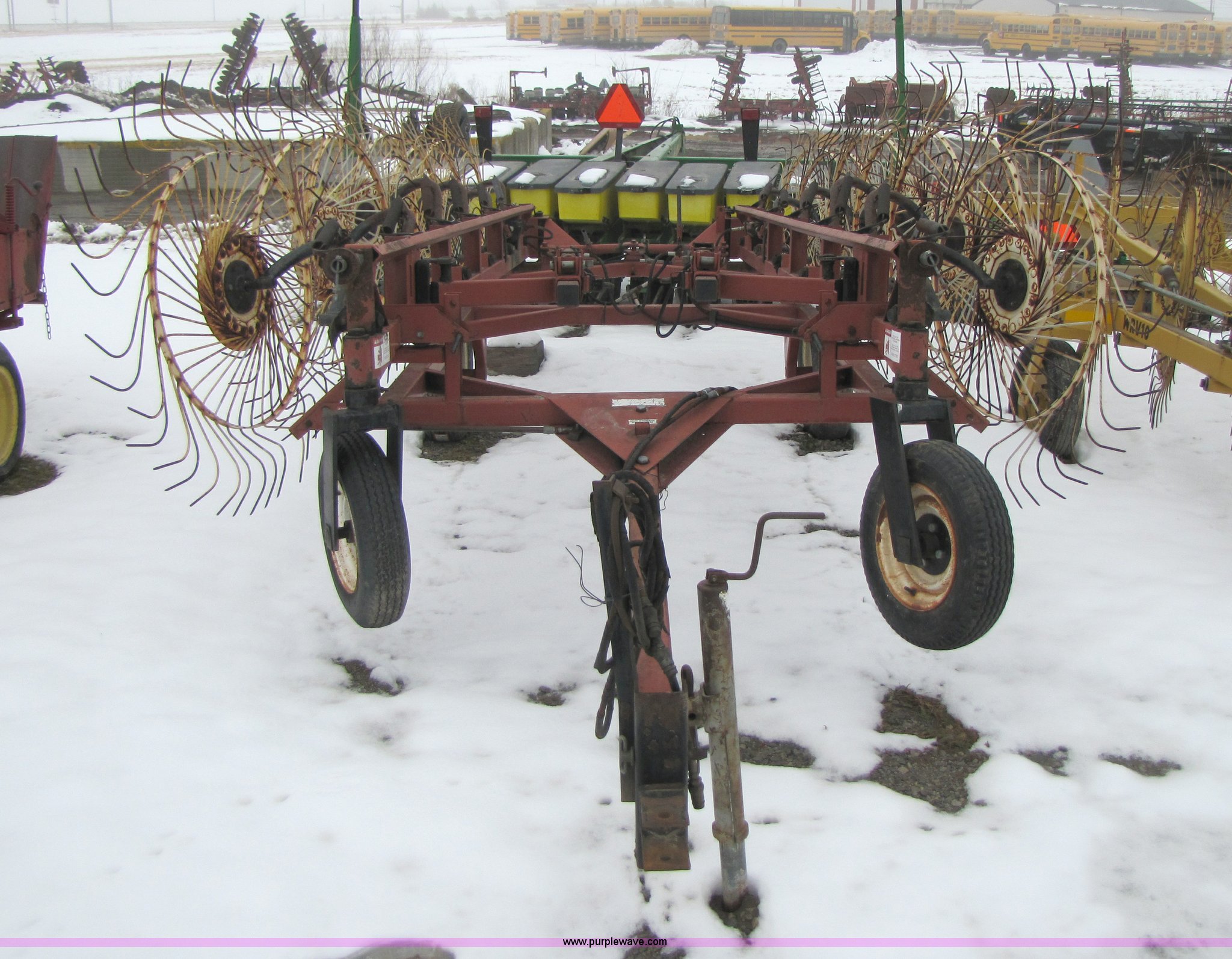 Hesston 3982 12 wheel rake in Cameron, MO | Item 3549 sold | Purple Wave