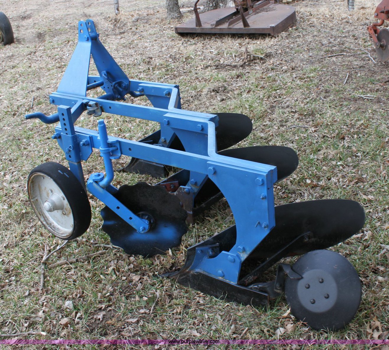 Ford three bottom plow in Wichita, KS | Item 6386 sold | Purple Wave