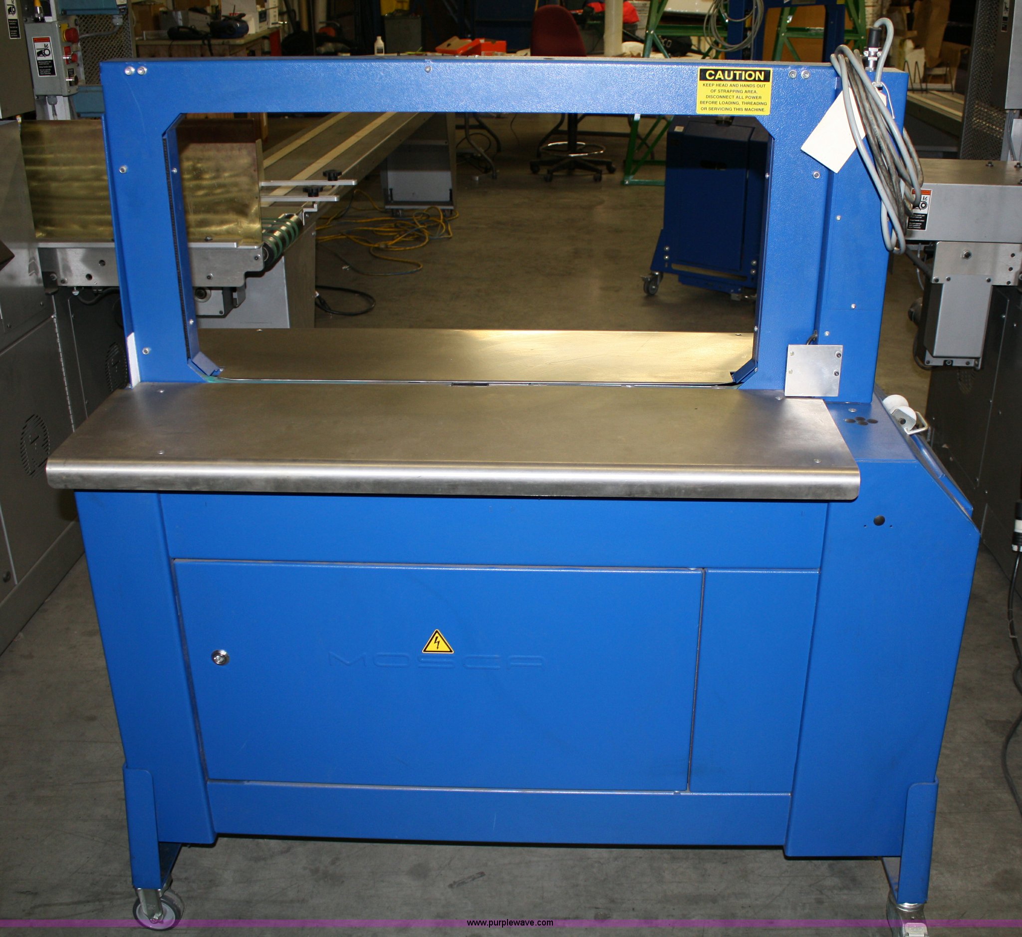 Mosca strapping machine in Spring Hill, KS | Item 4901 sold | Purple Wave