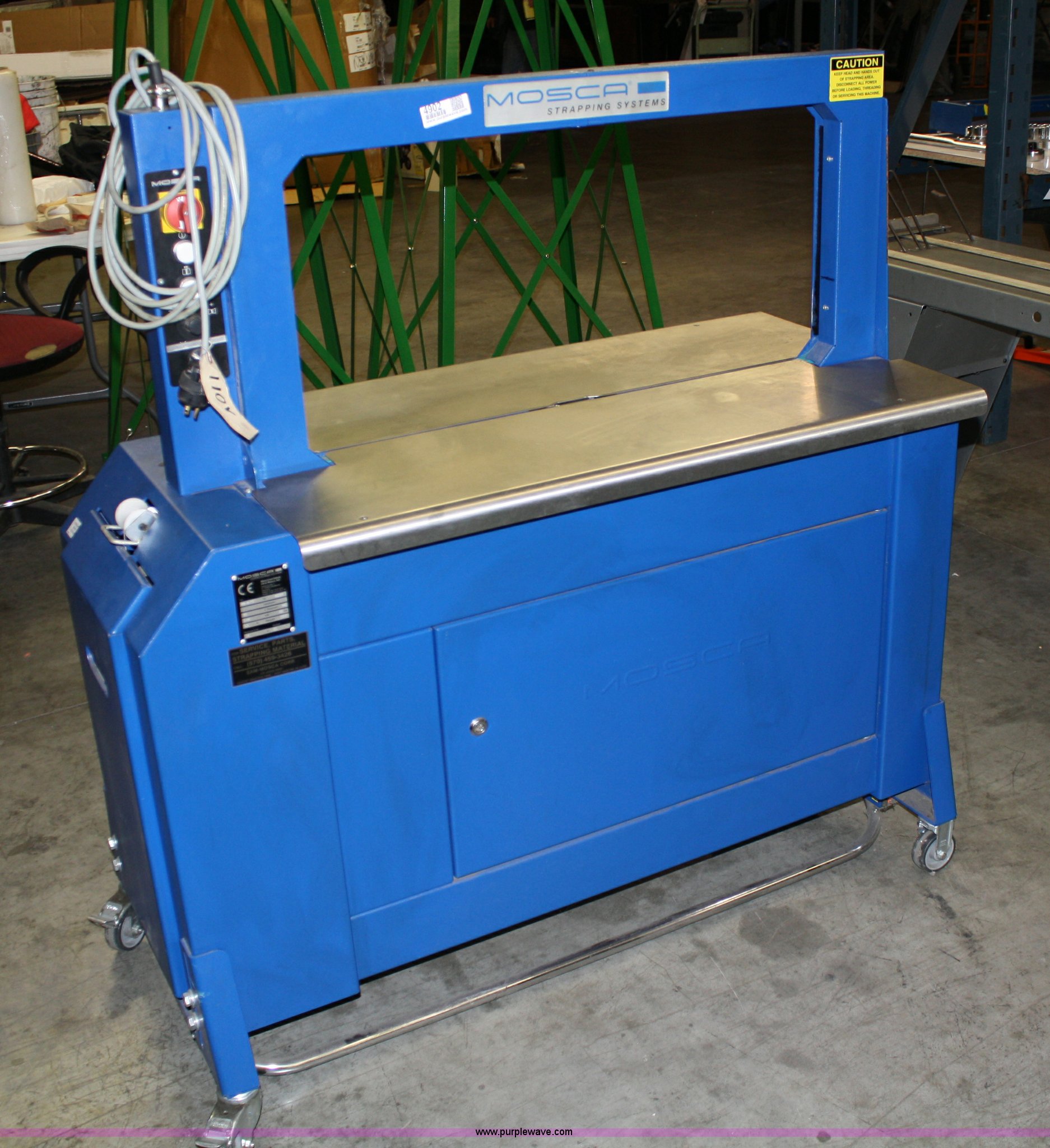 Mosca strapping machine in Spring Hill, KS | Item 4902 sold | Purple Wave