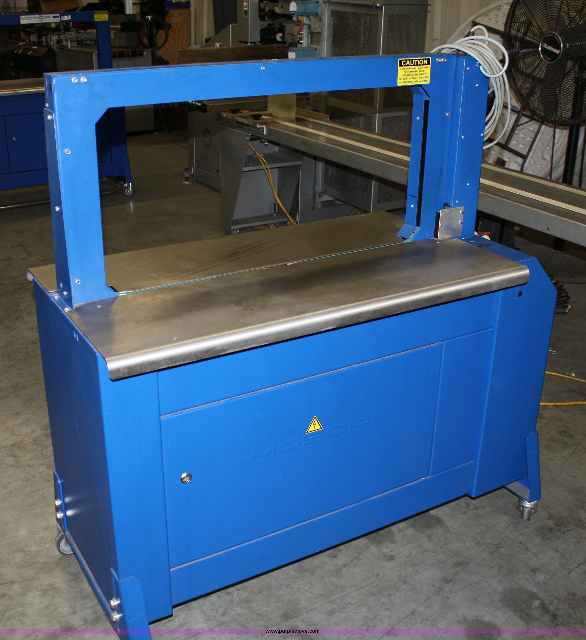 Mosca strapping machine in Spring Hill, KS | Item 4902 sold | Purple Wave