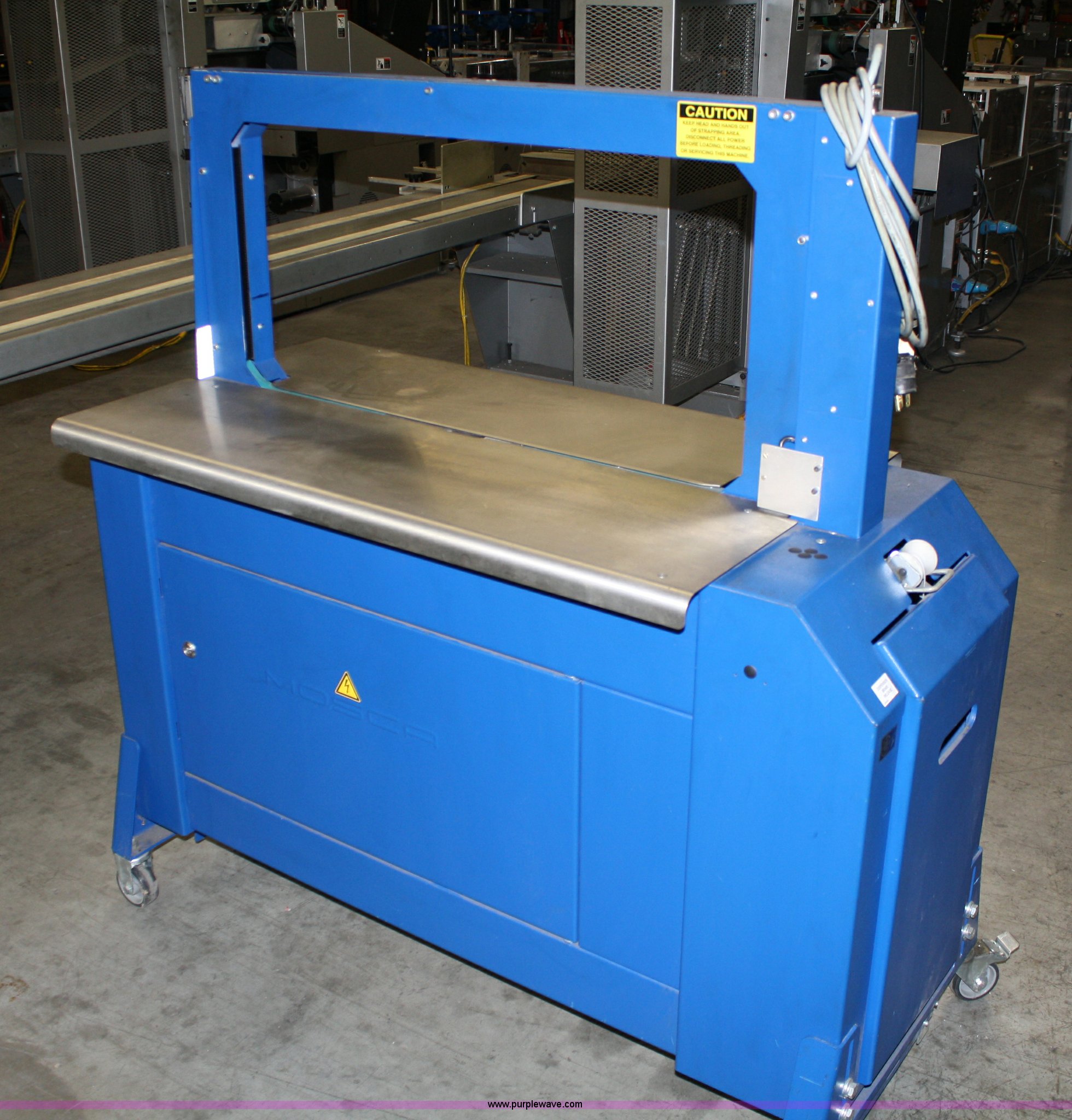 Mosca strapping machine in Spring Hill, KS | Item 4902 sold | Purple Wave