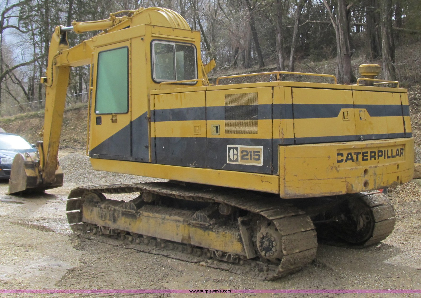 1989 Caterpillar 215 excavator in Asbury, IA | Item 4103 sold | Purple Wave