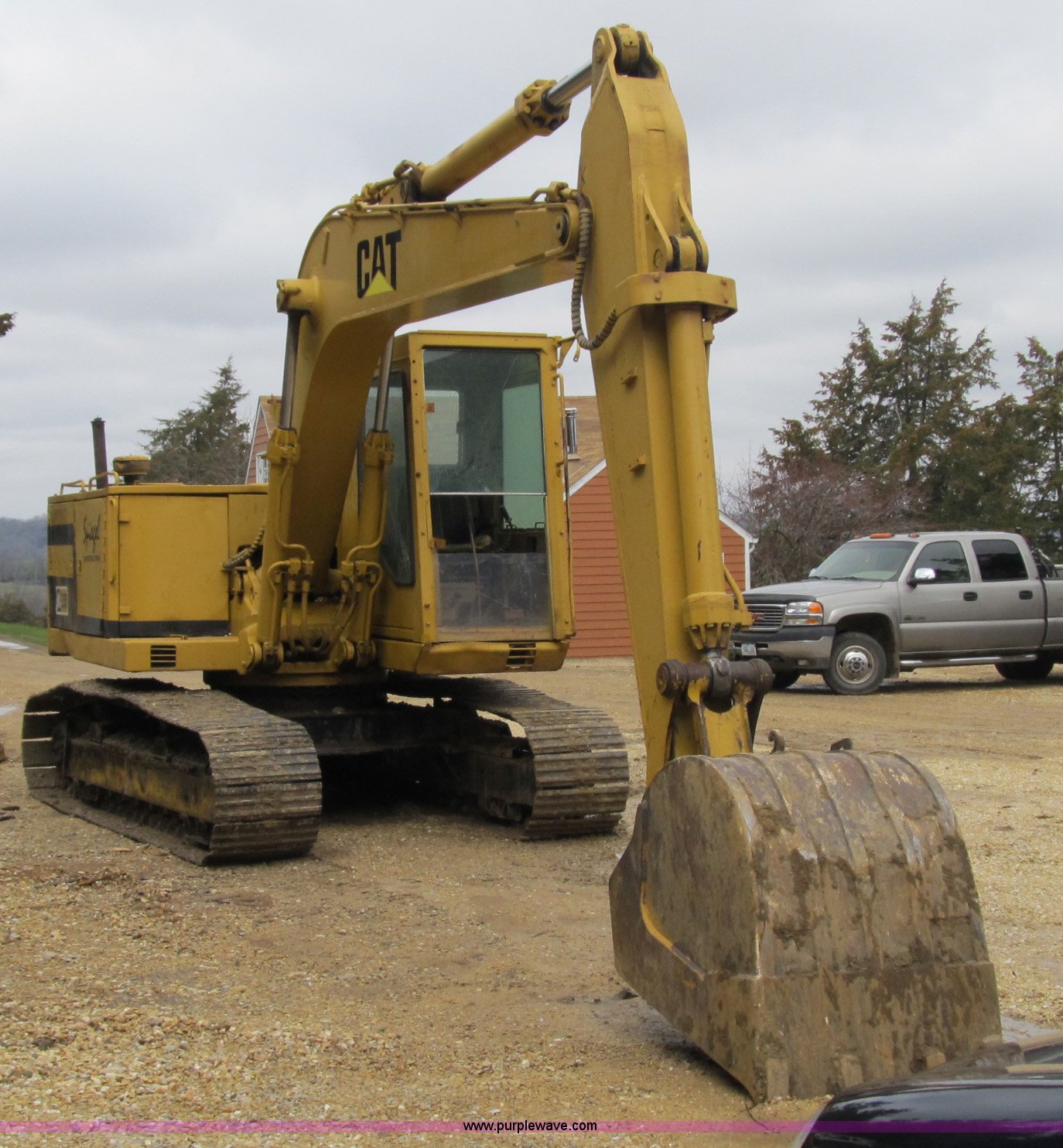 1989 Caterpillar 215 excavator in Asbury, IA | Item 4103 sold | Purple Wave