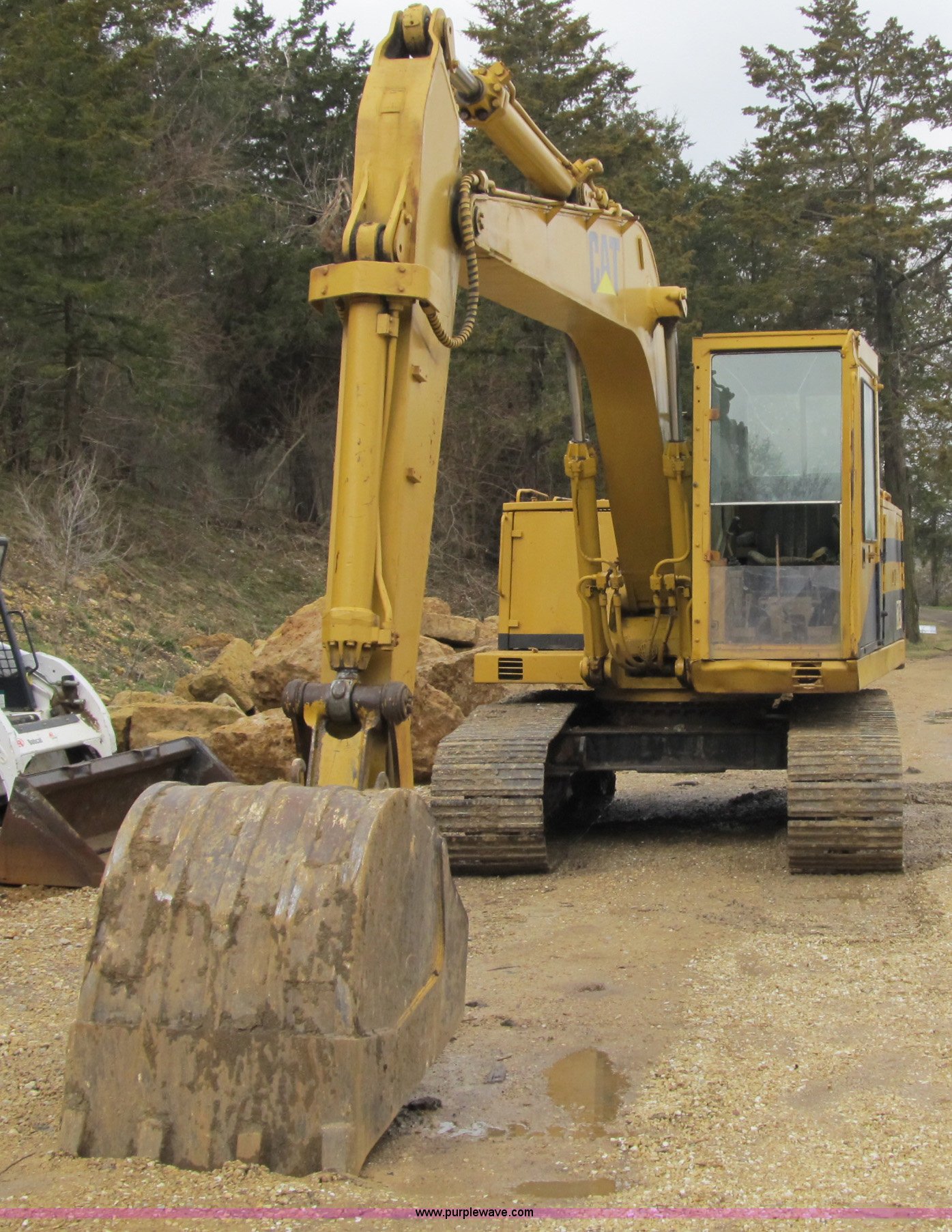 1989 Caterpillar 215 excavator in Asbury, IA | Item 4103 sold | Purple Wave