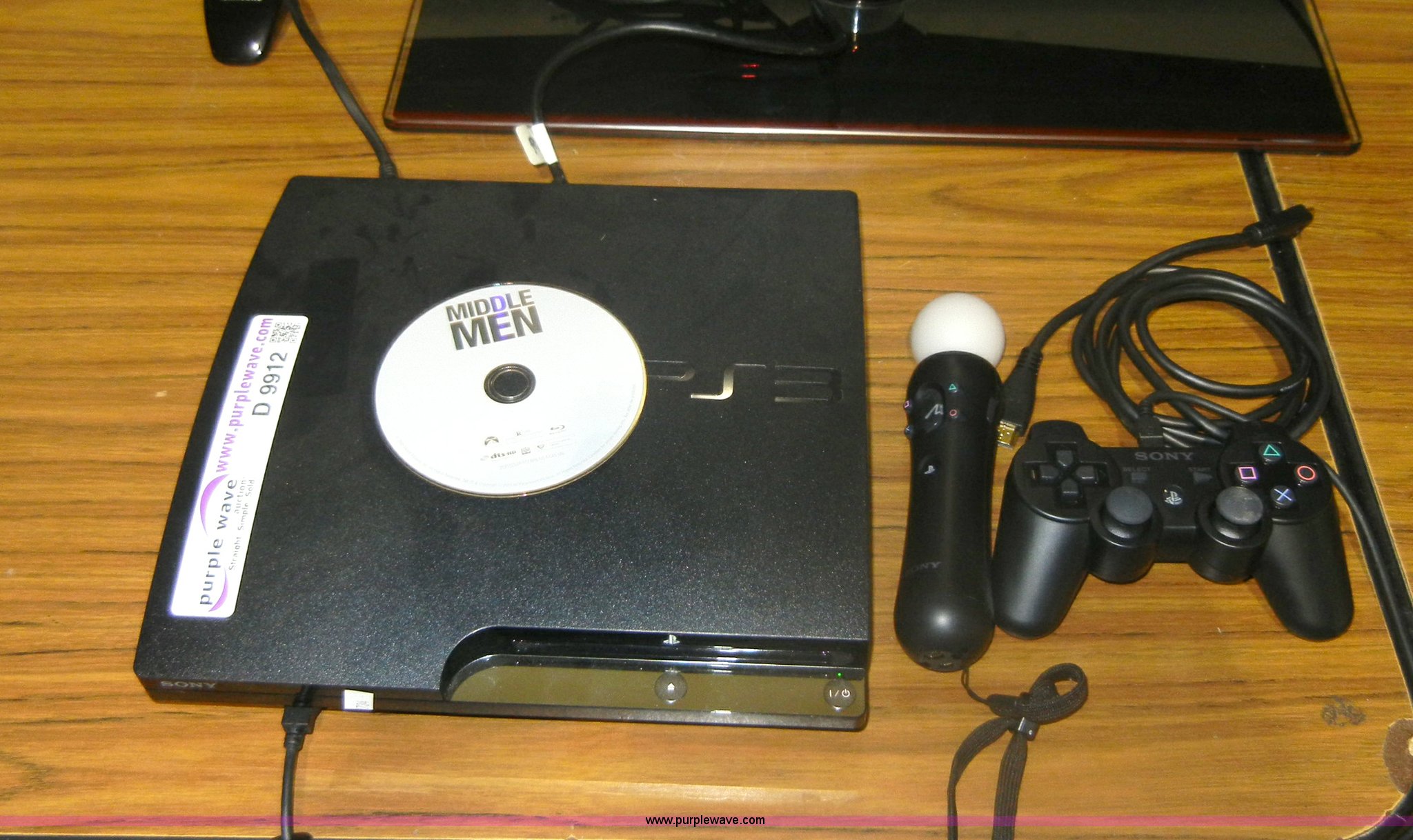 Sony Playstation 3 game console with controller, Move controller and ...