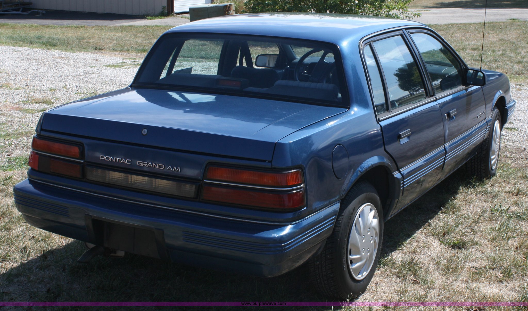 1990 Pontiac Grand Am LE in Paola, KS | Item A2347 sold | Purple Wave