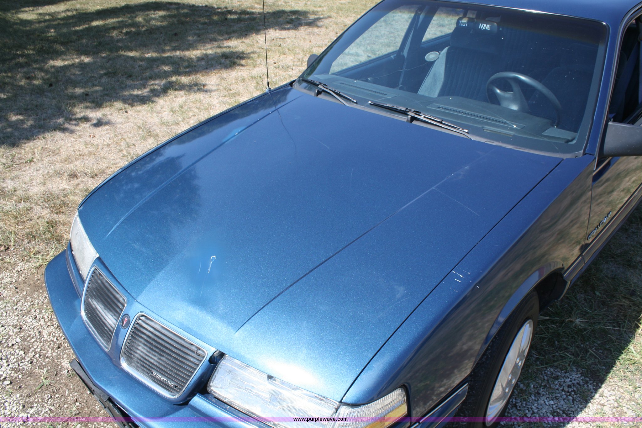 1990 Pontiac Grand Am LE in Paola, KS | Item A2347 sold | Purple Wave