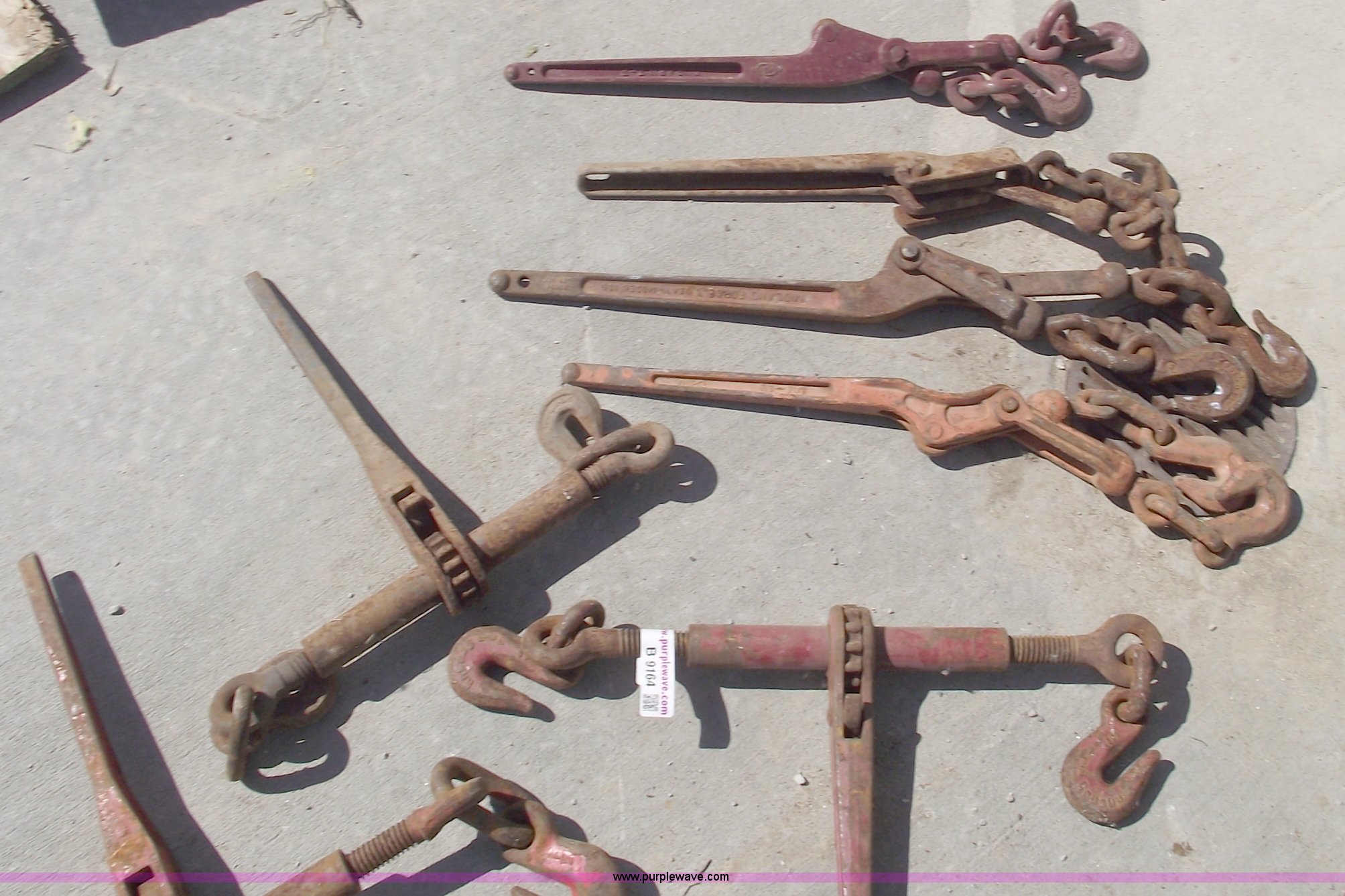 (12) assorted chain boomers in Liberty, MO | Item B9164 sold | Purple Wave