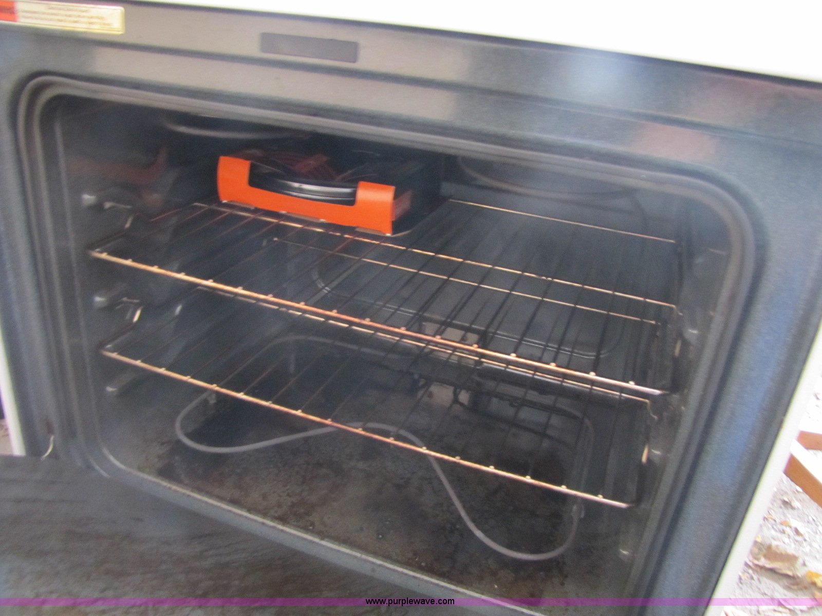 Roper four burner stove/oven in Branson, MO | Item F9015 sold | Purple Wave