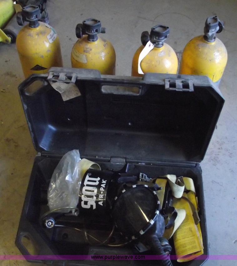 Fire fighter Scott air pack mask with four tanks in North Kansas City ...