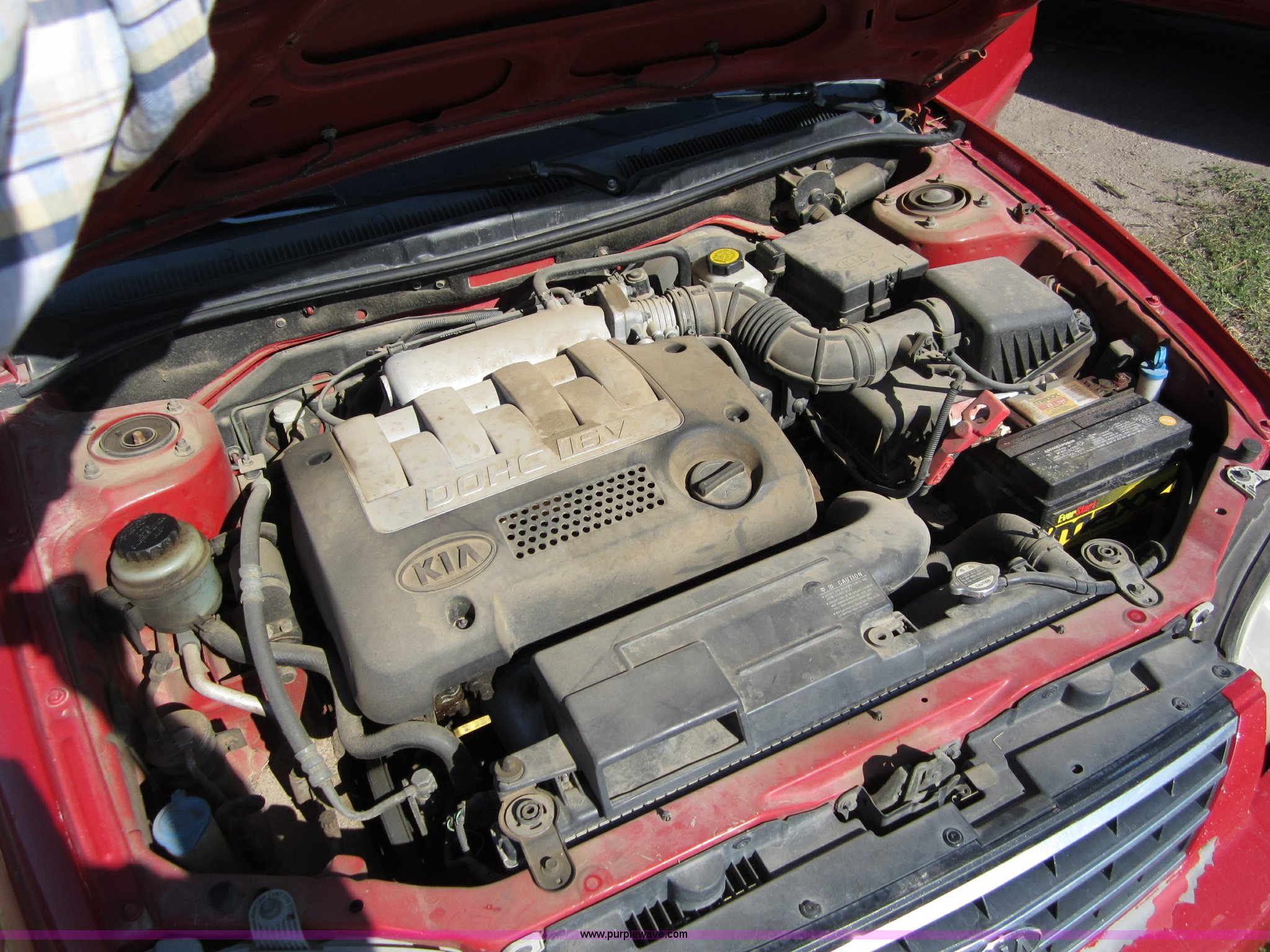 2003 Kia Spectra in Dodge City, KS | Item J9020 sold | Purple Wave