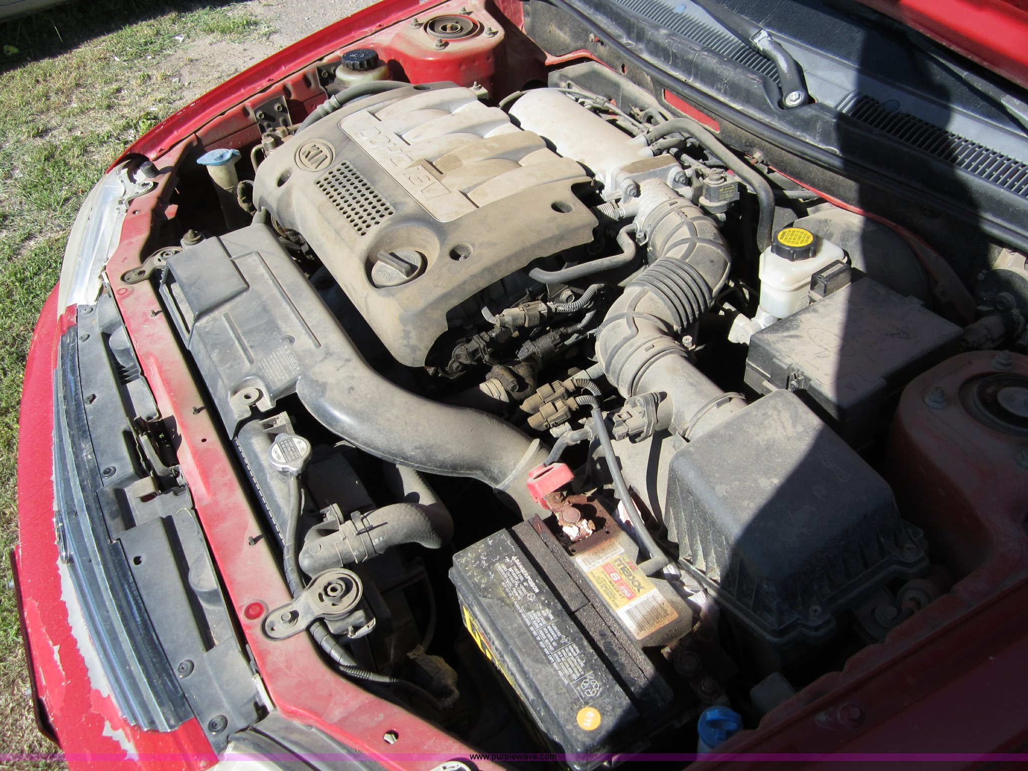 2003 Kia Spectra in Dodge City, KS | Item J9020 sold | Purple Wave