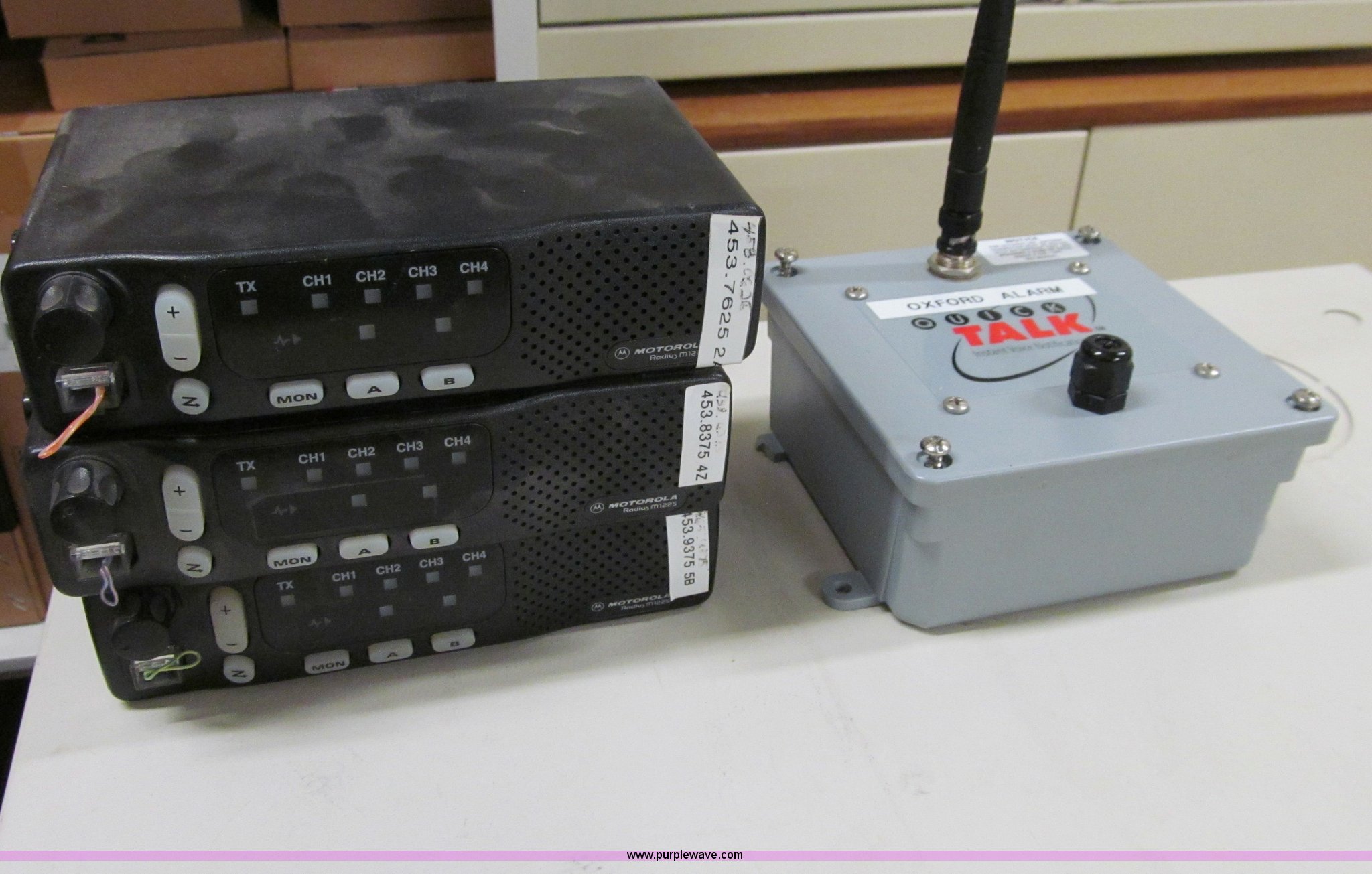 (2) Motorola radio racks in Iowa City, IA | Item A8415 sold | Purple Wave