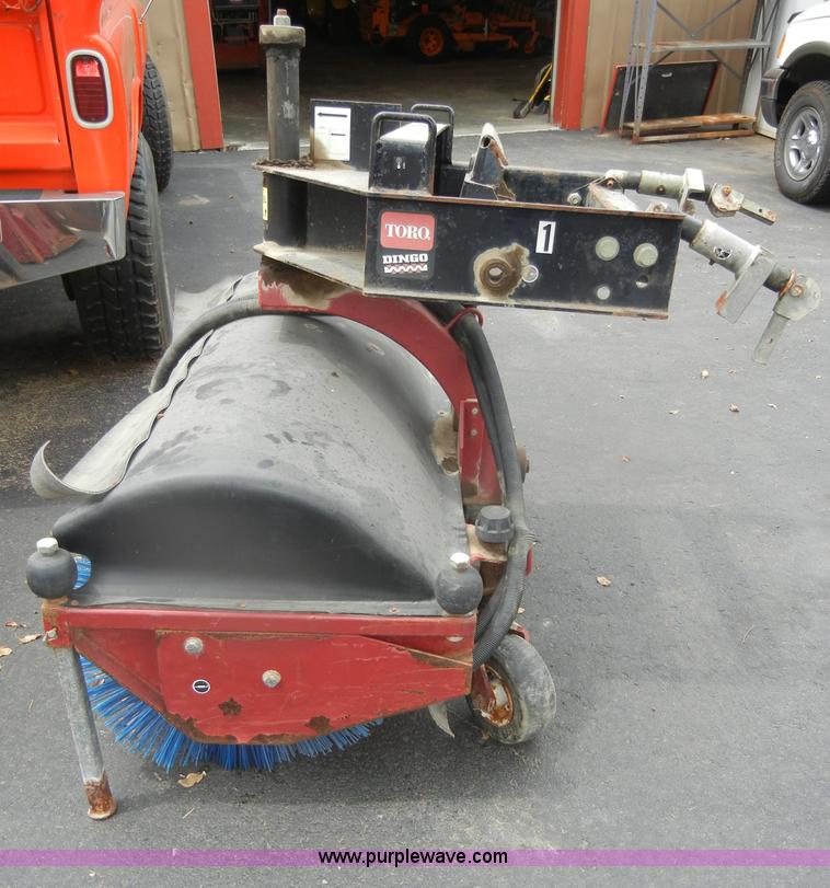 Toro Dingo broom attachment in Shawnee, KS | Item M9712 sold | Purple Wave