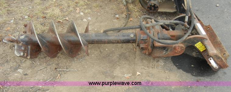 Toro Dingo auger attachment in Shawnee, KS | Item M9719 sold | Purple Wave