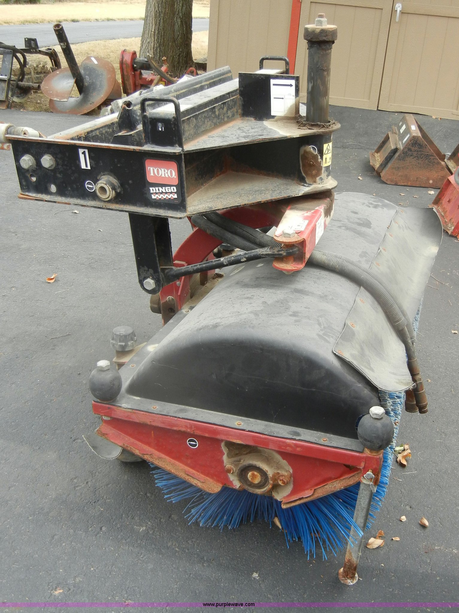 Toro Dingo broom attachment in Shawnee, KS | Item M9712 sold | Purple Wave