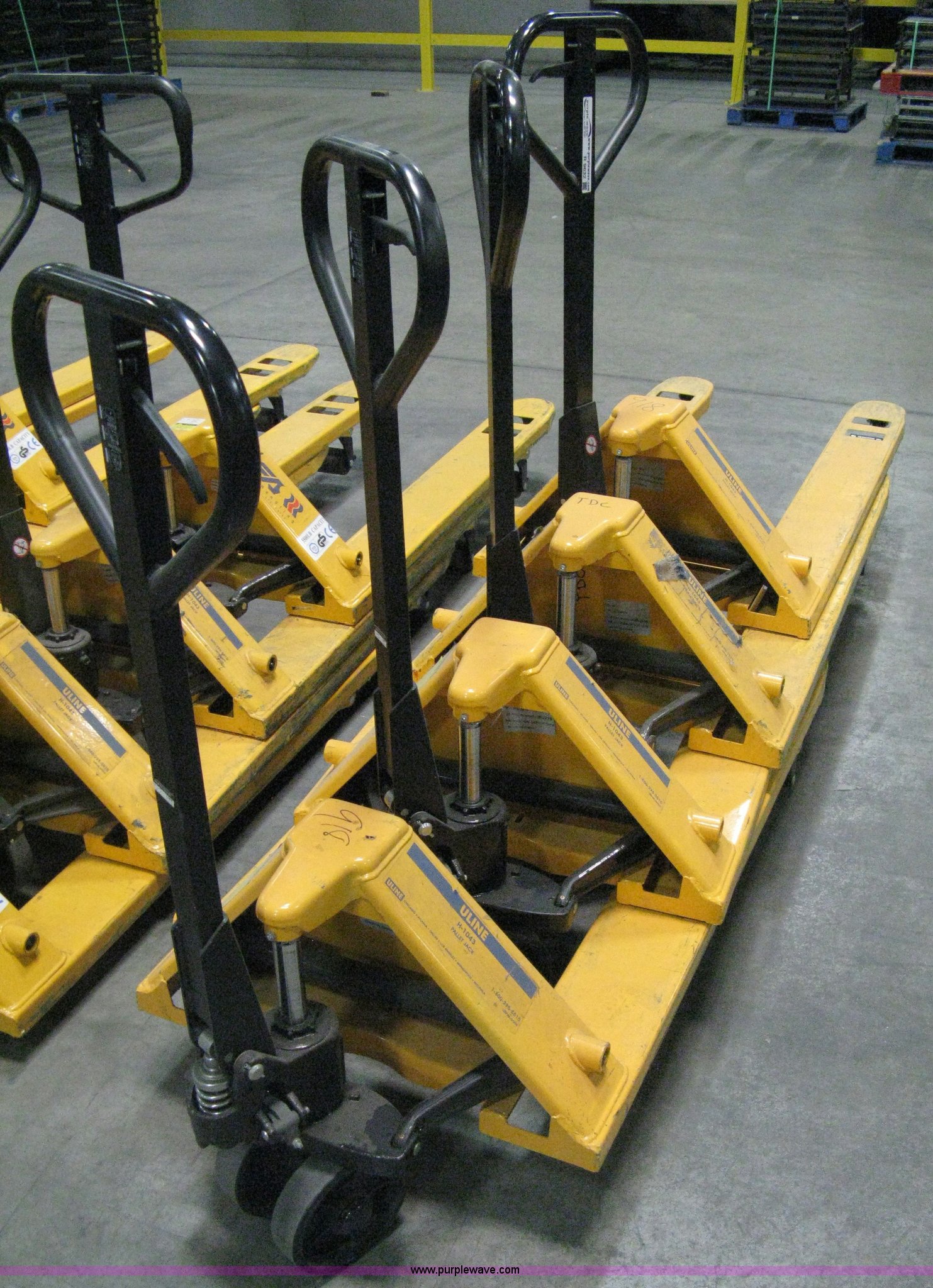 (4) Uline pallet jacks in Park City, KS | Item R9632 sold | Purple Wave