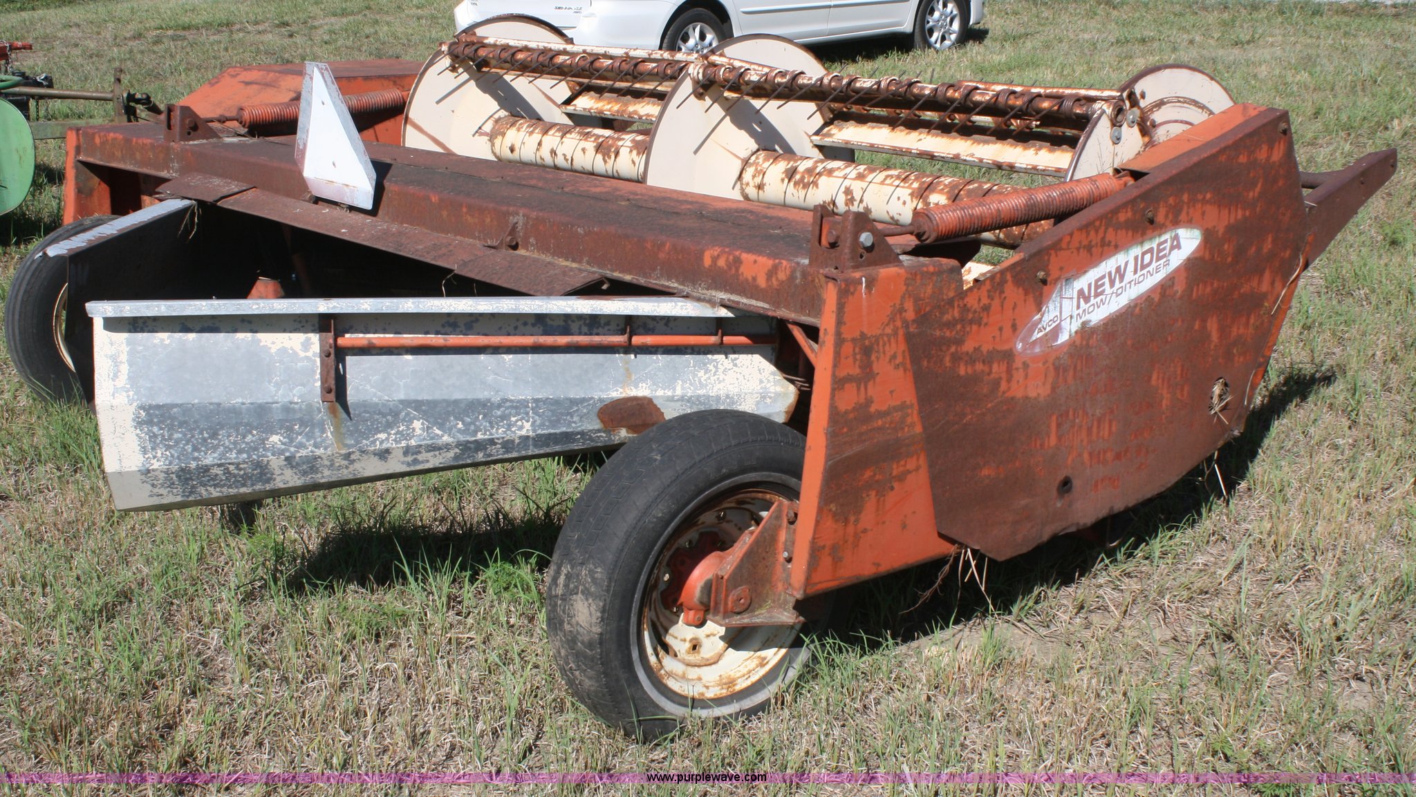 New Idea 290 swather in Lawrence, KS | Item B6942 sold | Purple Wave