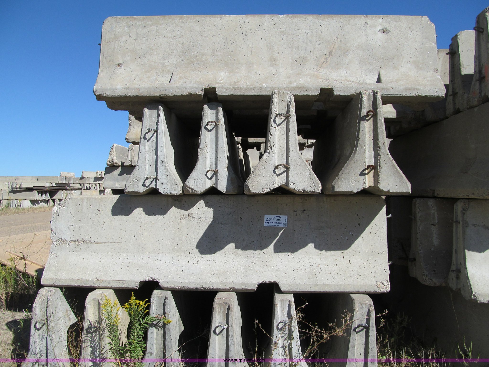 (12) concrete J barriers in Maple Grove, MN | Item F5525 sold | Purple Wave