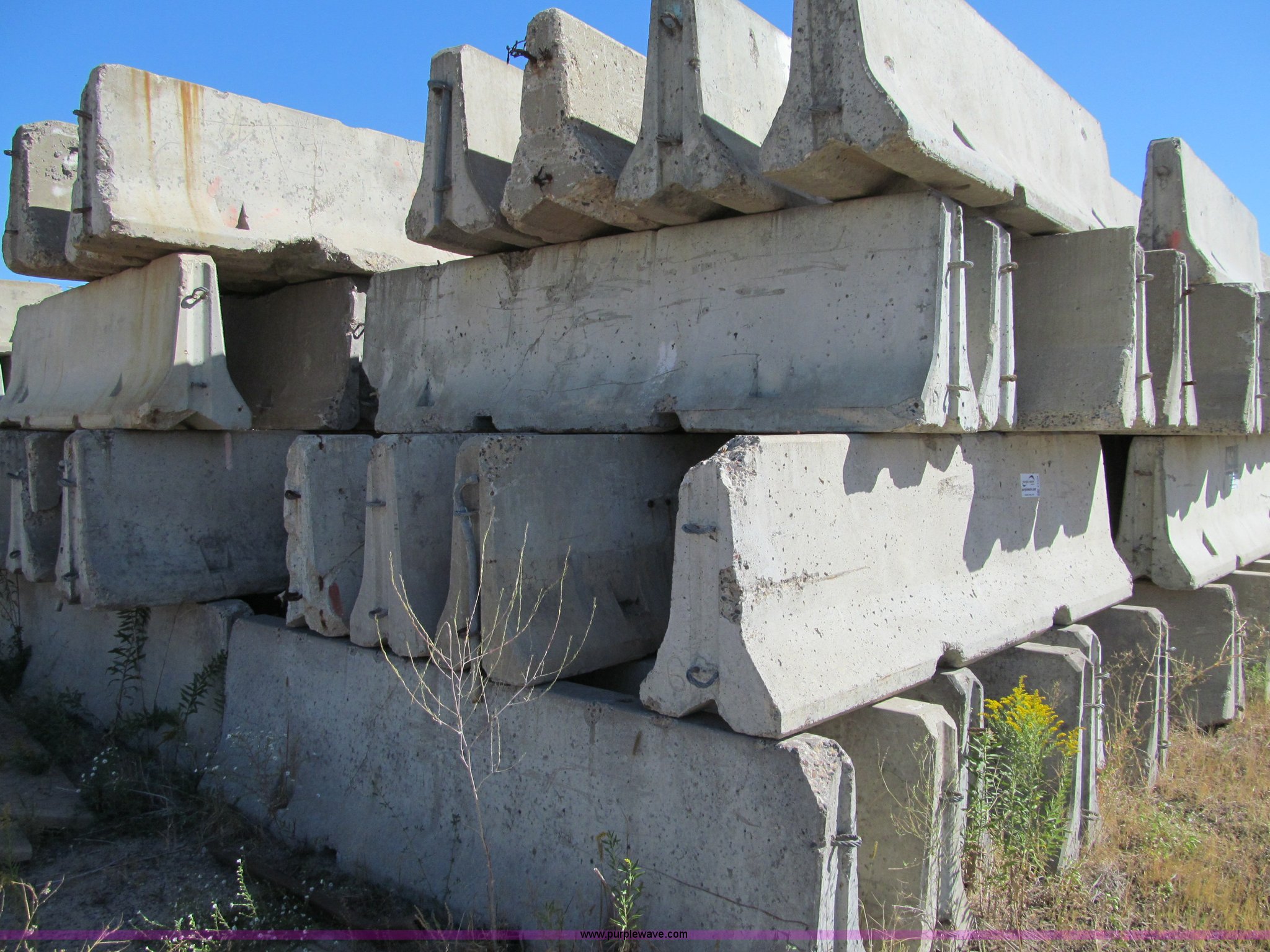 (12) concrete J barriers in Maple Grove, MN | Item F5525 sold | Purple Wave