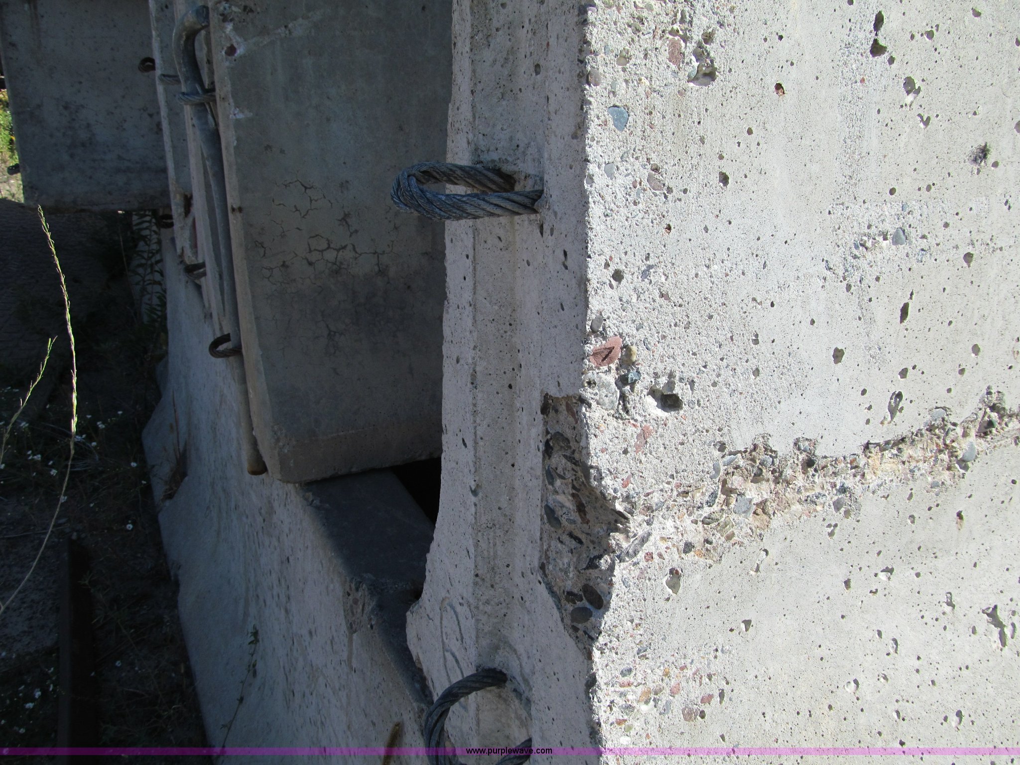 (12) concrete J barriers in Maple Grove, MN | Item F5525 sold | Purple Wave