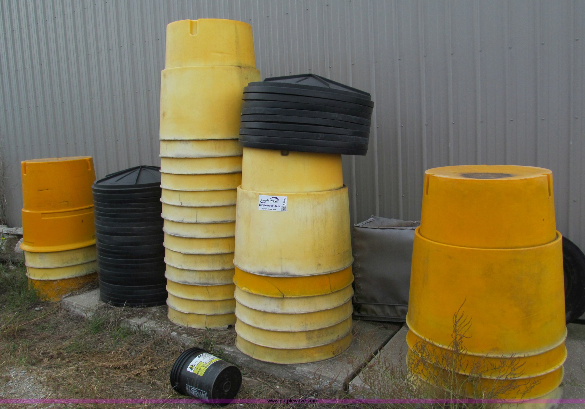 (26) safety crash barrels in Odessa, MO | Item E5603 sold | Purple Wave