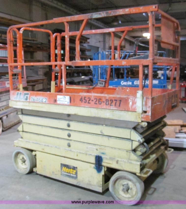 1999 JLG 2646E2 scissor lift in Odessa, MO | Item E5606 sold | Purple Wave