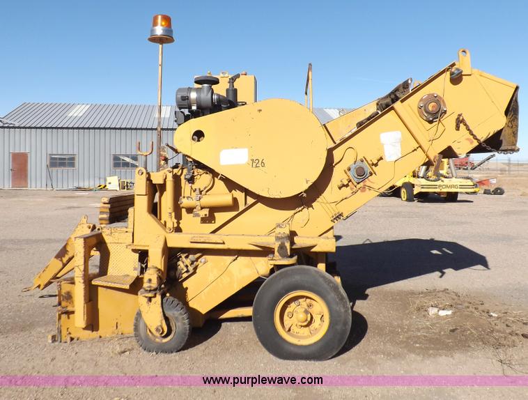 CMI Corp Windrow asphalt elevating machine in Elkhart, KS | Item F6343 ...