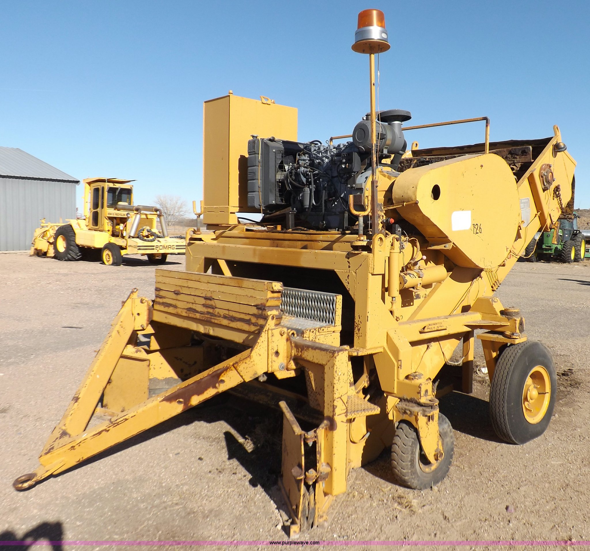 CMI Corp Windrow asphalt elevating machine in Elkhart, KS | Item F6343 ...