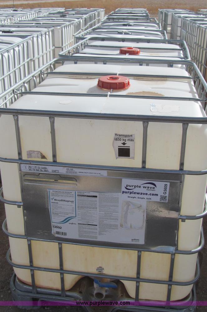 (10) poly storage tanks with aluminum cages in Dalhart, TX | Item G5609 ...