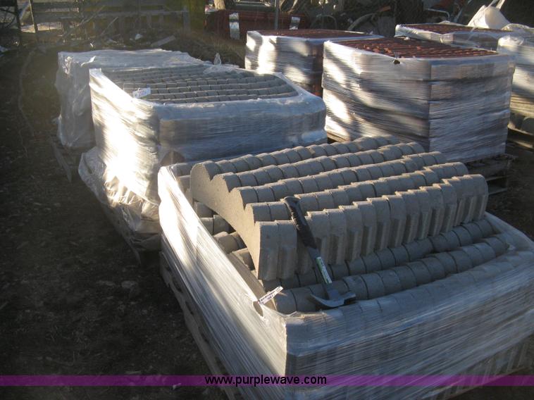 Approx. 360 pieces of 24" curved scallop edging/tree rings on 3 pallets ...