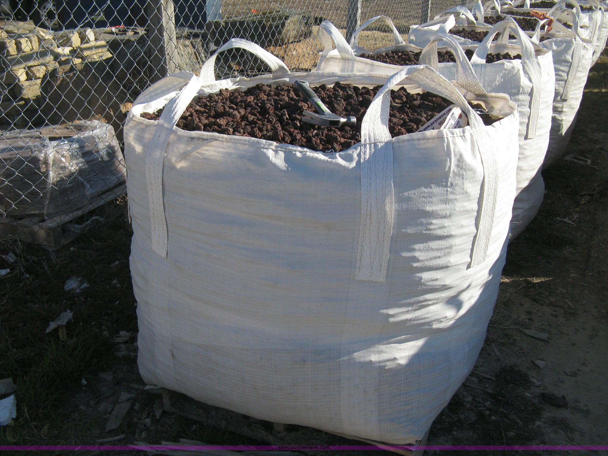 2 maroon lava rock bags in Wichita, KS | Item Y9931 sold | Purple Wave