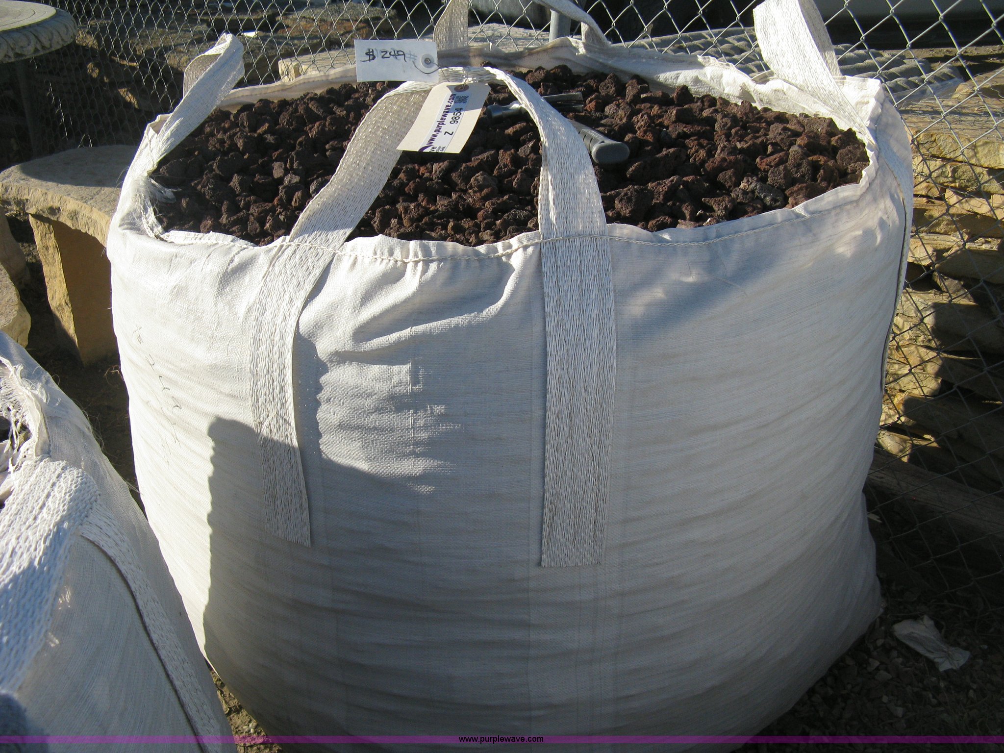 Maroon lava rocks in Wichita, KS | Item Z9854 sold | Purple Wave