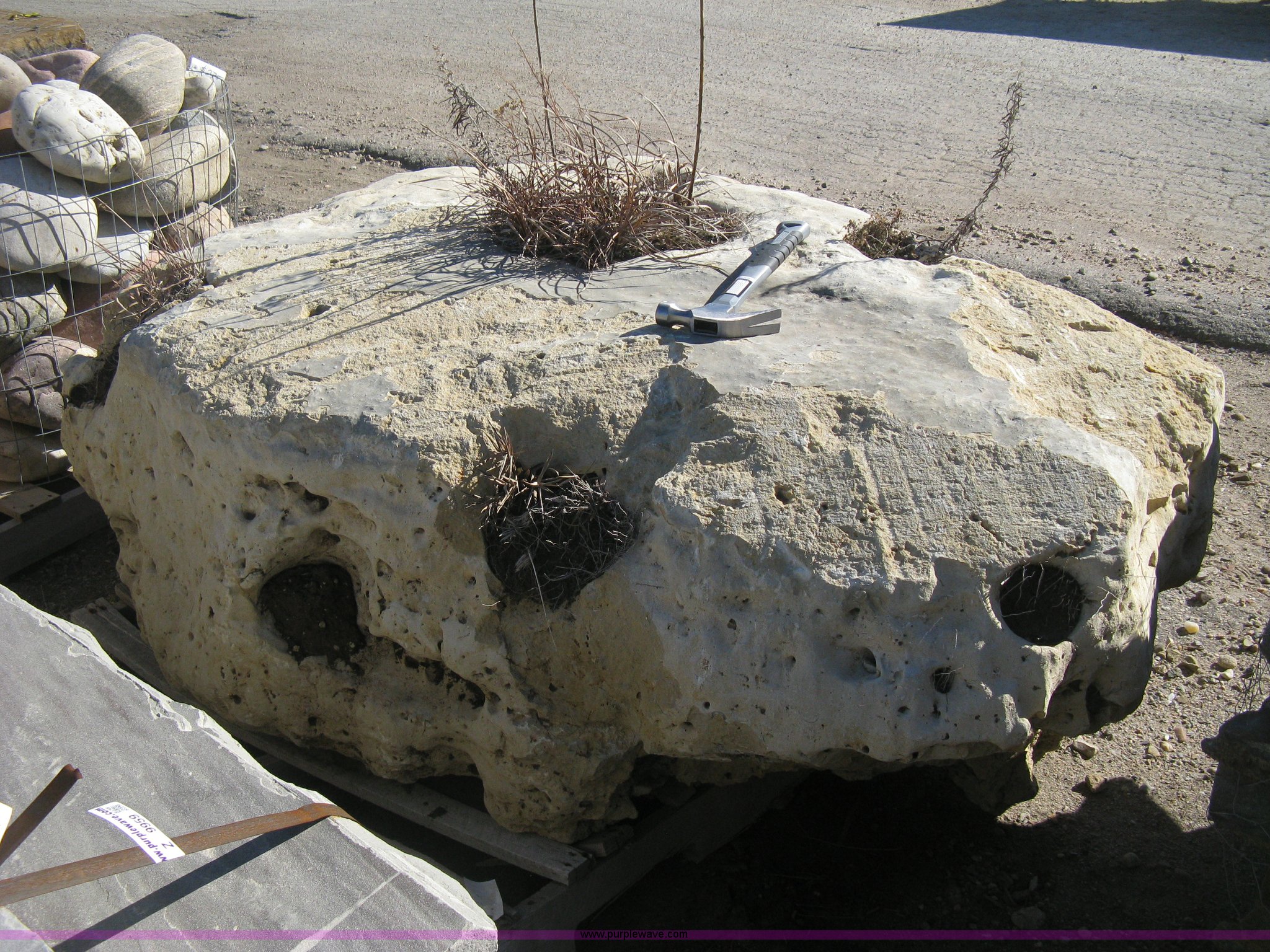 Holey limestone boulder in Wichita, KS | Item Z9960 sold | Purple Wave