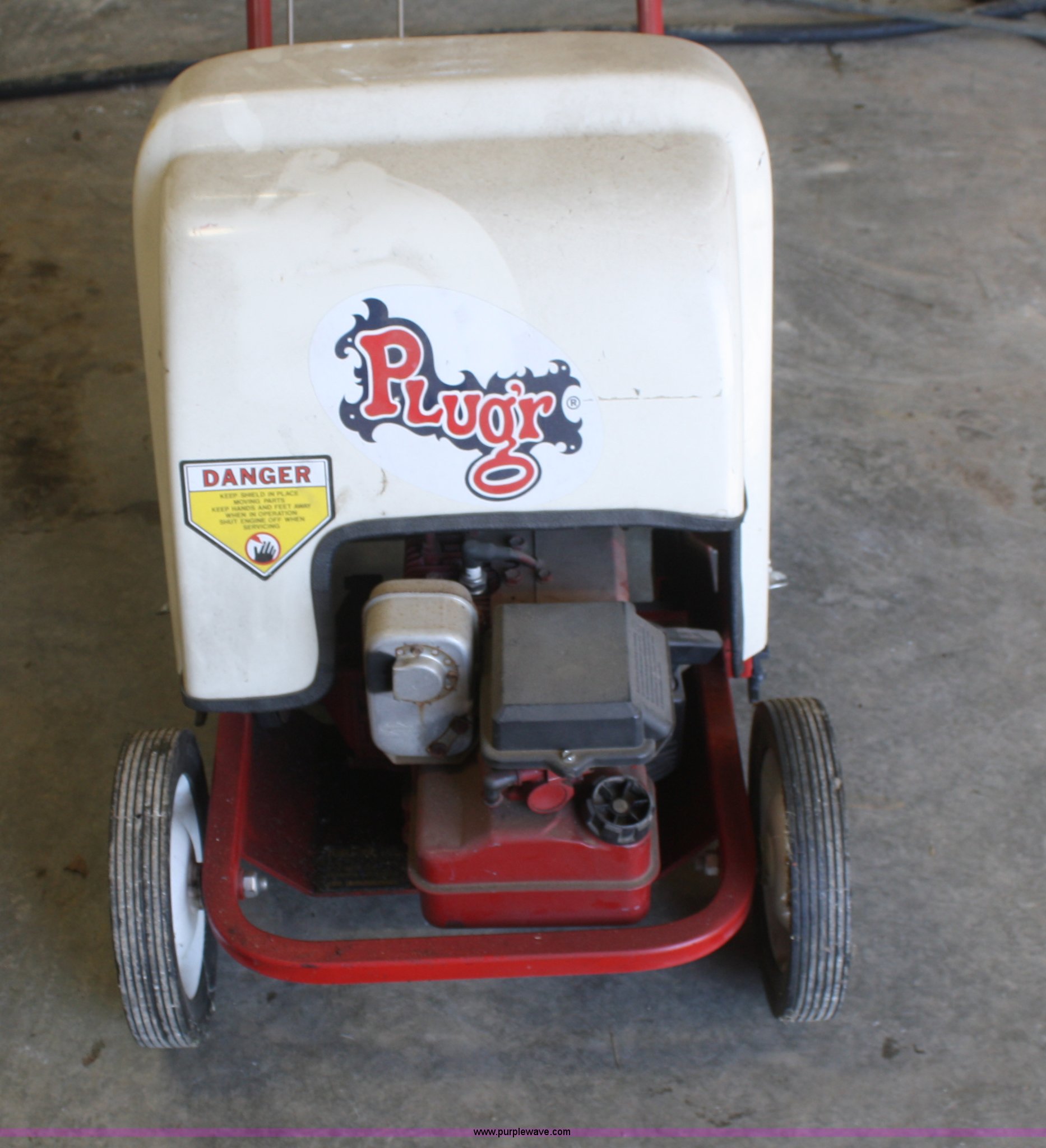 Plugr aerator in Paola, KS | Item P9973 sold | Purple Wave