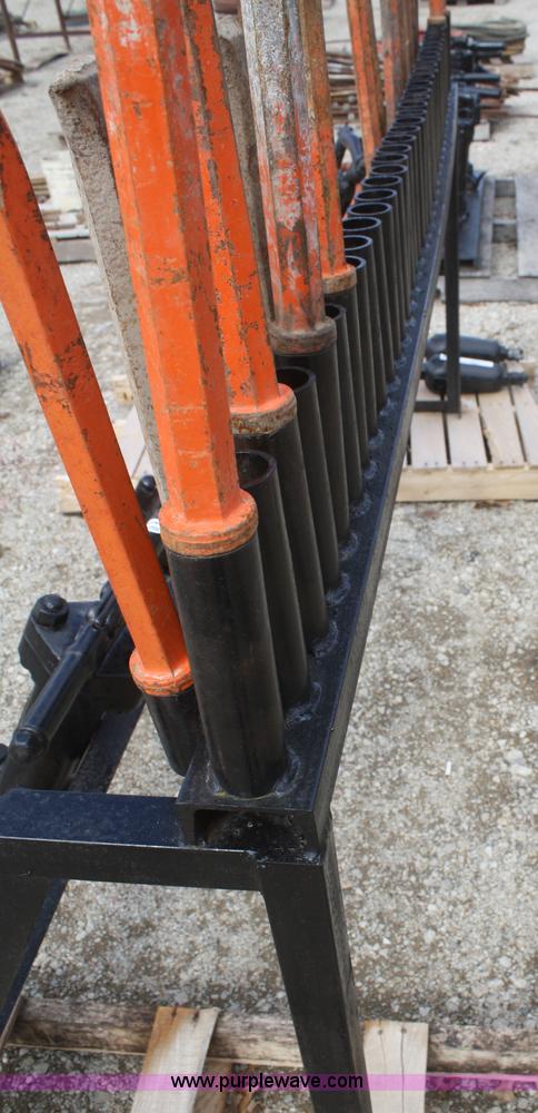 Jack hammer stands in Topeka, KS | Item V9566 sold | Purple Wave