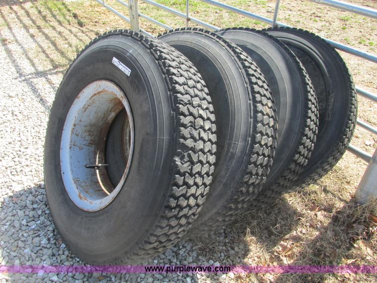 (4) 11R20 tires in Conway, MO | Item X9912 sold | Purple Wave