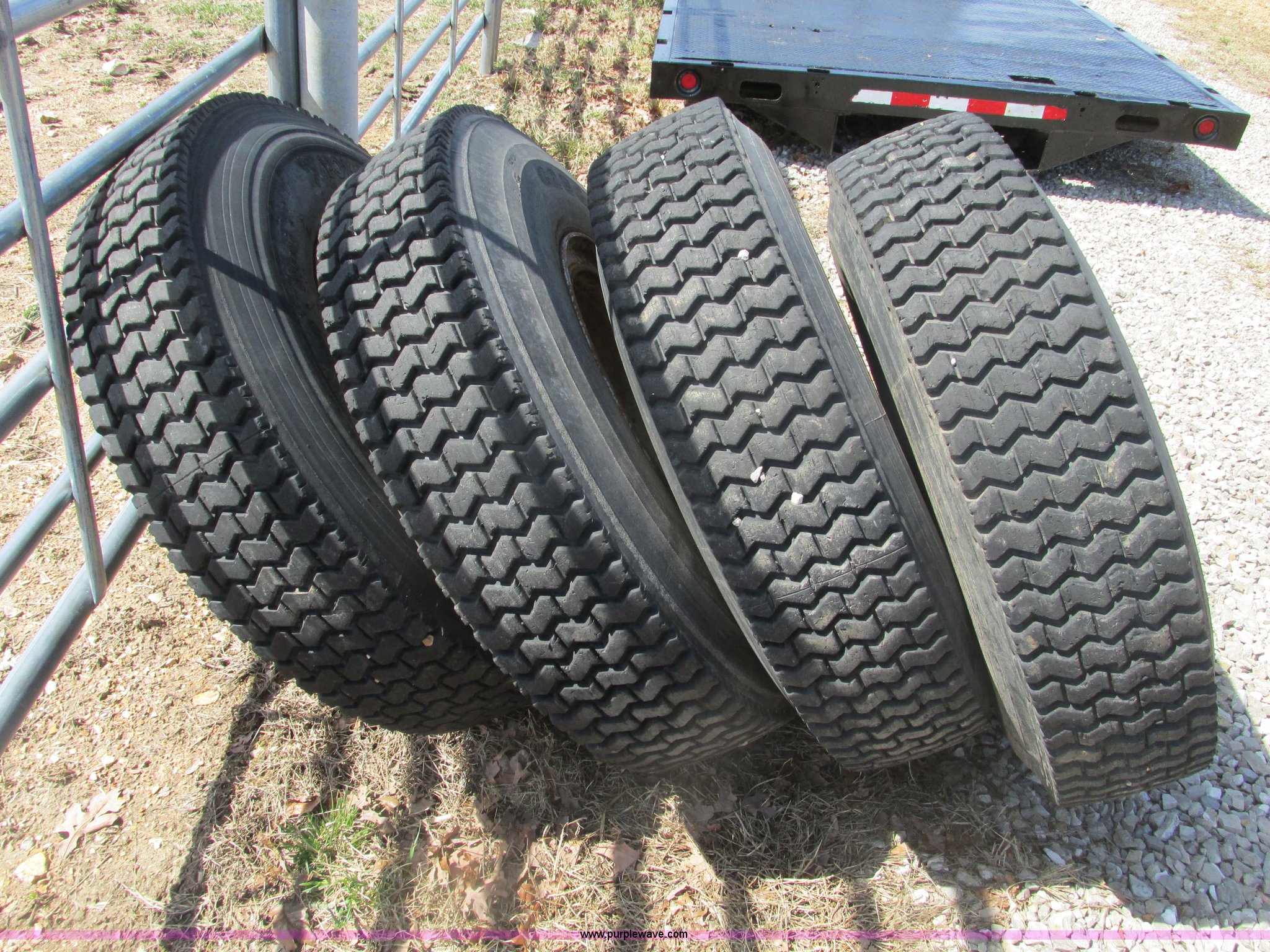 (4) 11R20 tires in Conway, MO | Item X9912 sold | Purple Wave