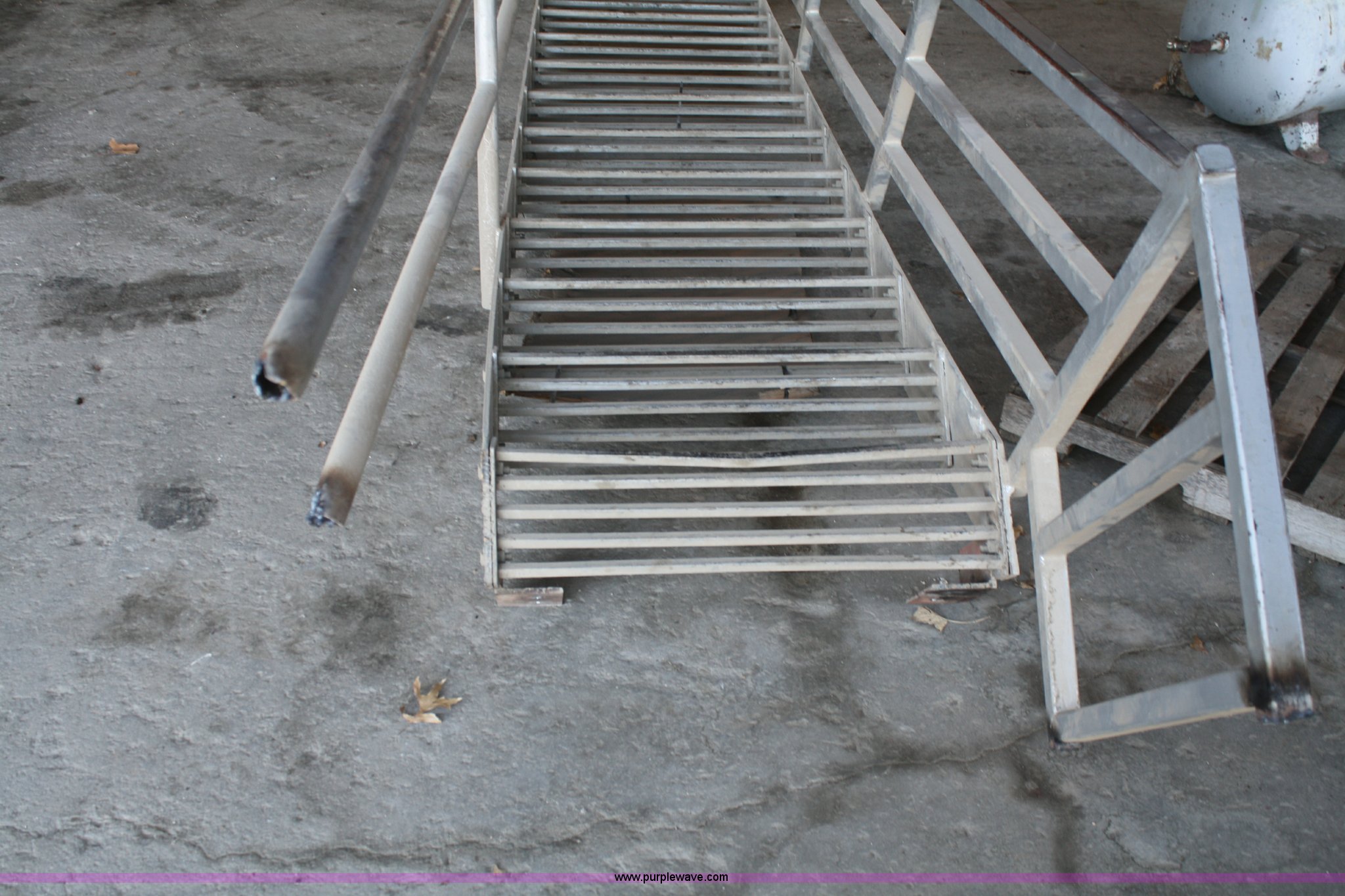 (12) step stairs in Lawrence, KS | Item V9704 sold | Purple Wave