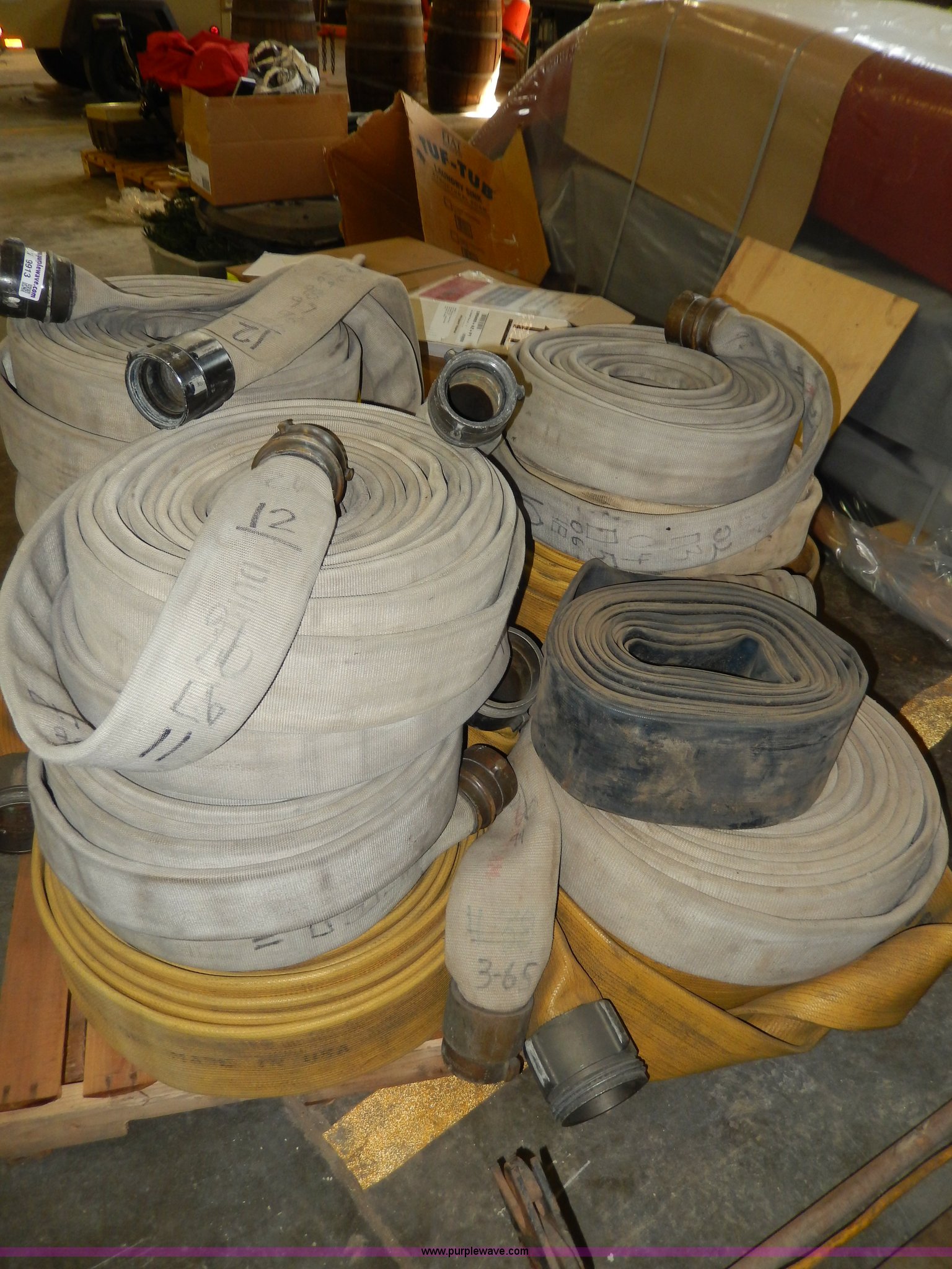 (17) assorted hydrant hoses in Merriam, KS | Item W9913 sold | Purple Wave