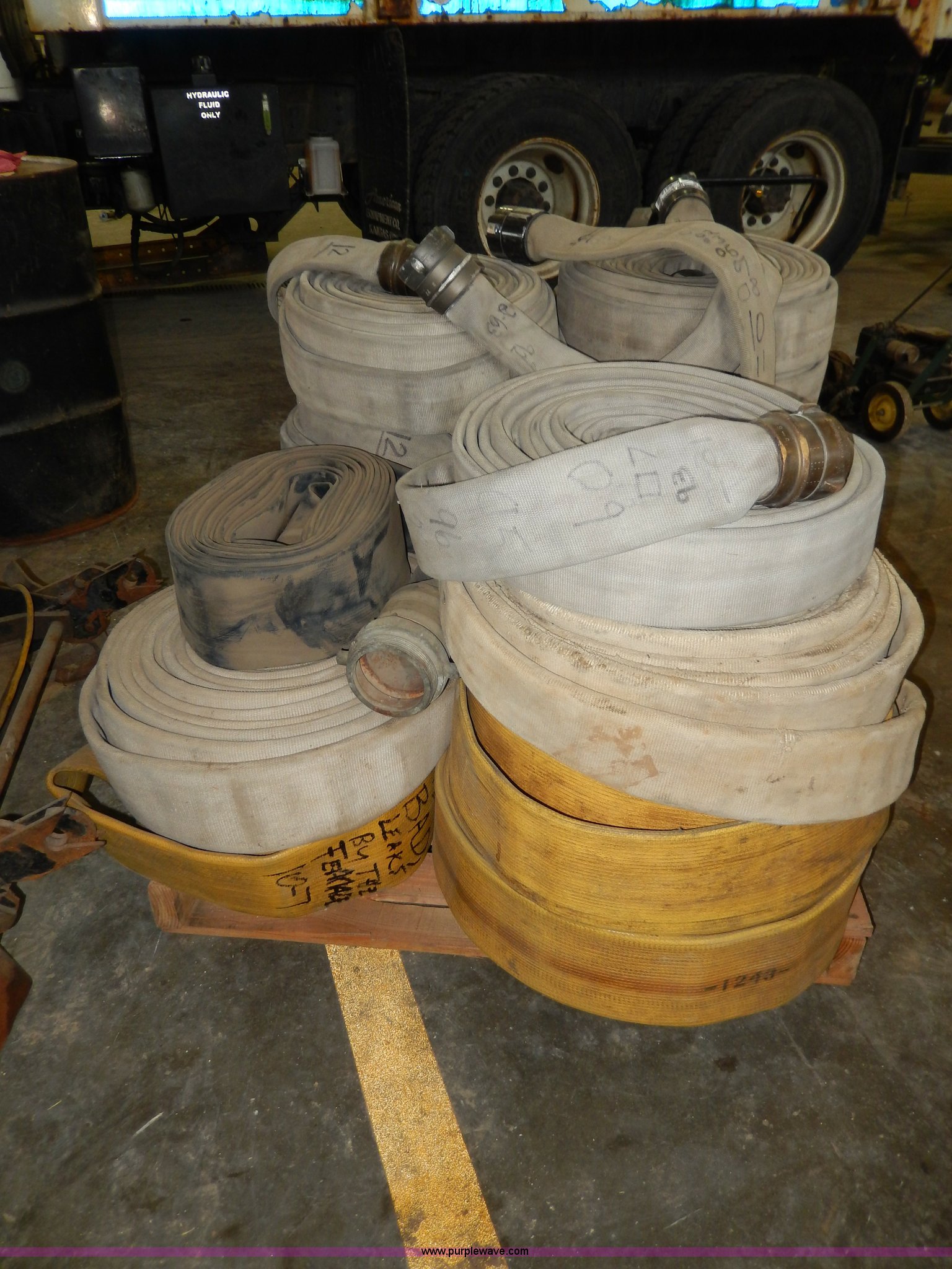 (17) assorted hydrant hoses in Merriam, KS | Item W9913 sold | Purple Wave